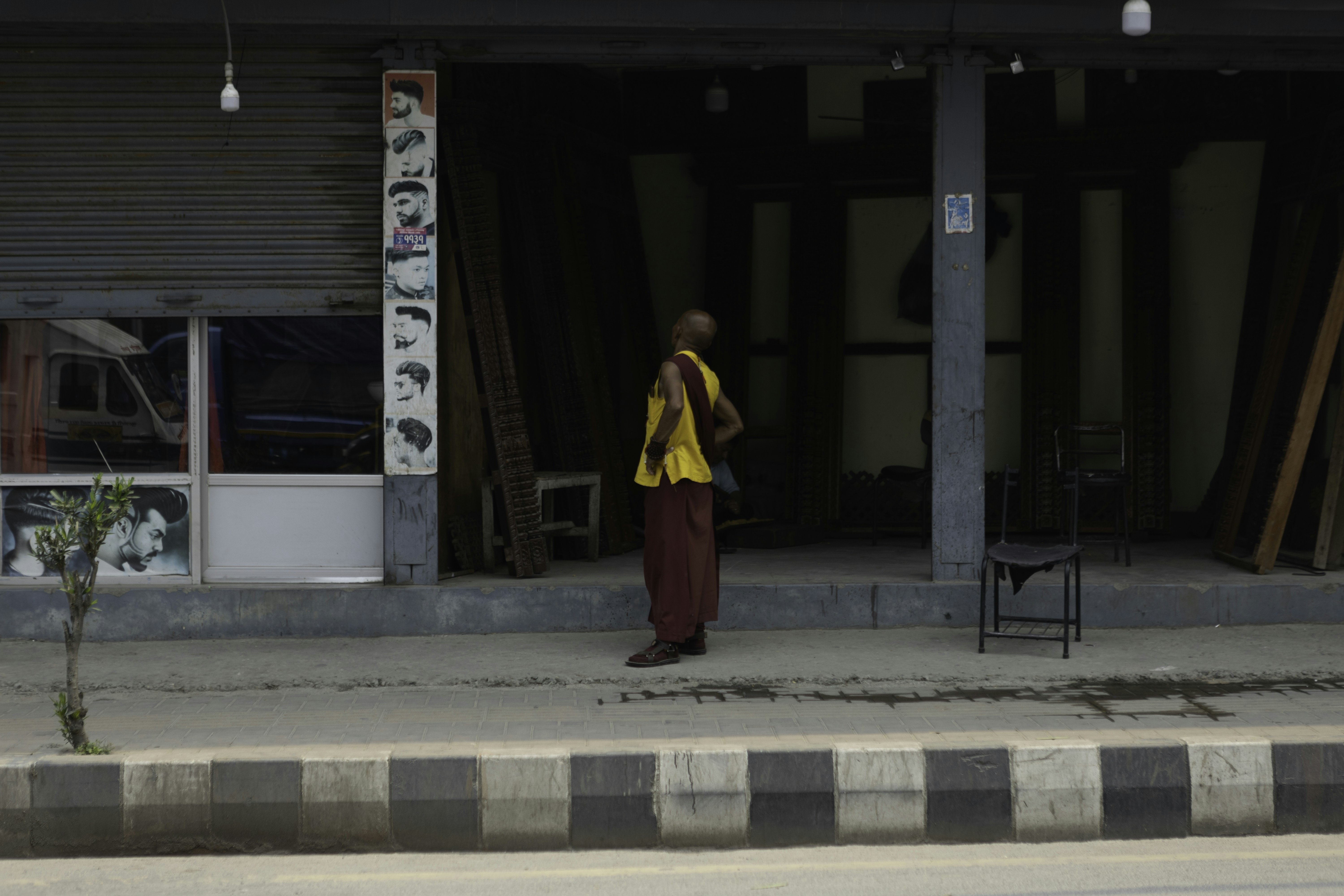 Monk in the Threshold: Quiet Presence Above the Street