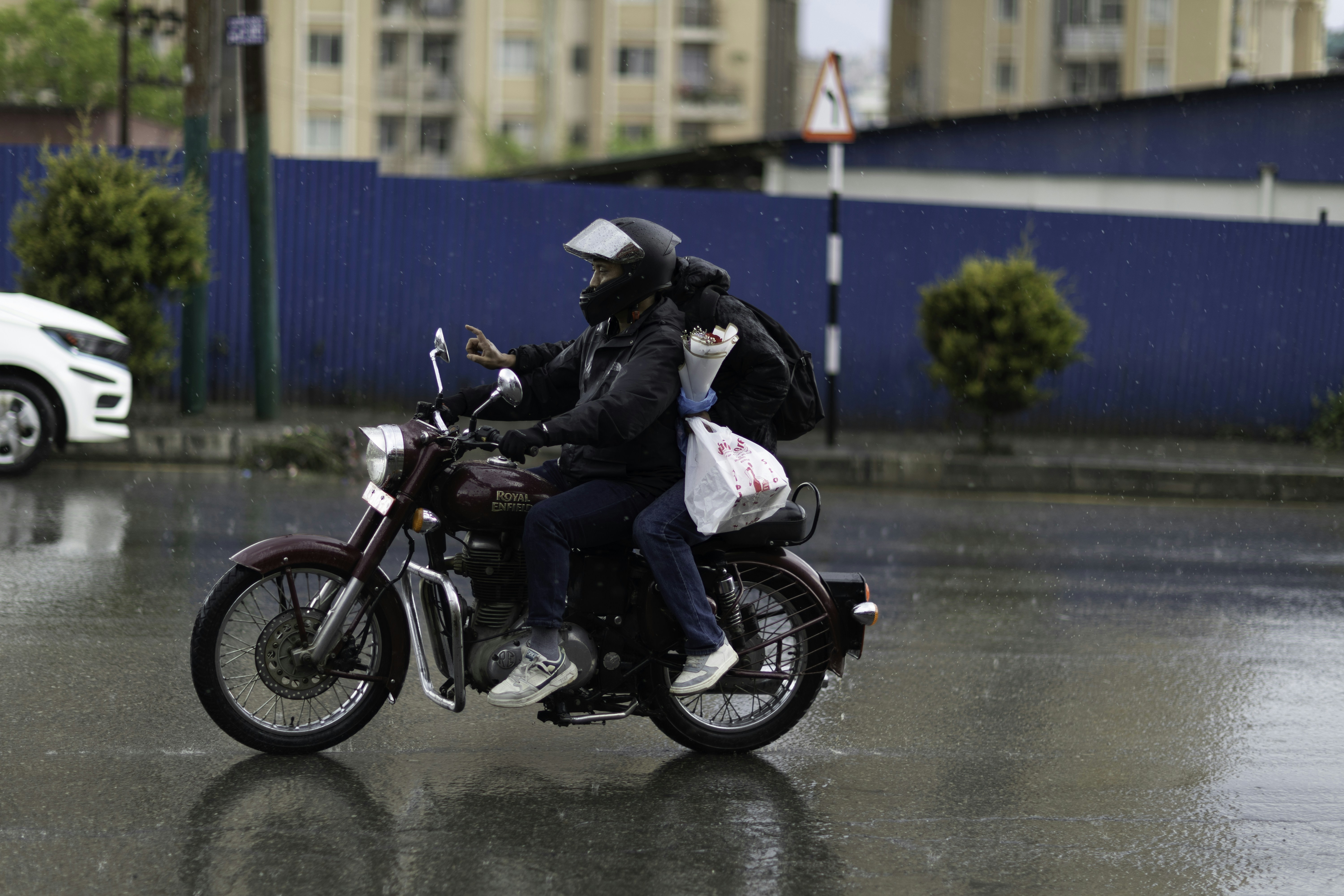 People Rushing Through Rain – Busy City Life in Monsoon