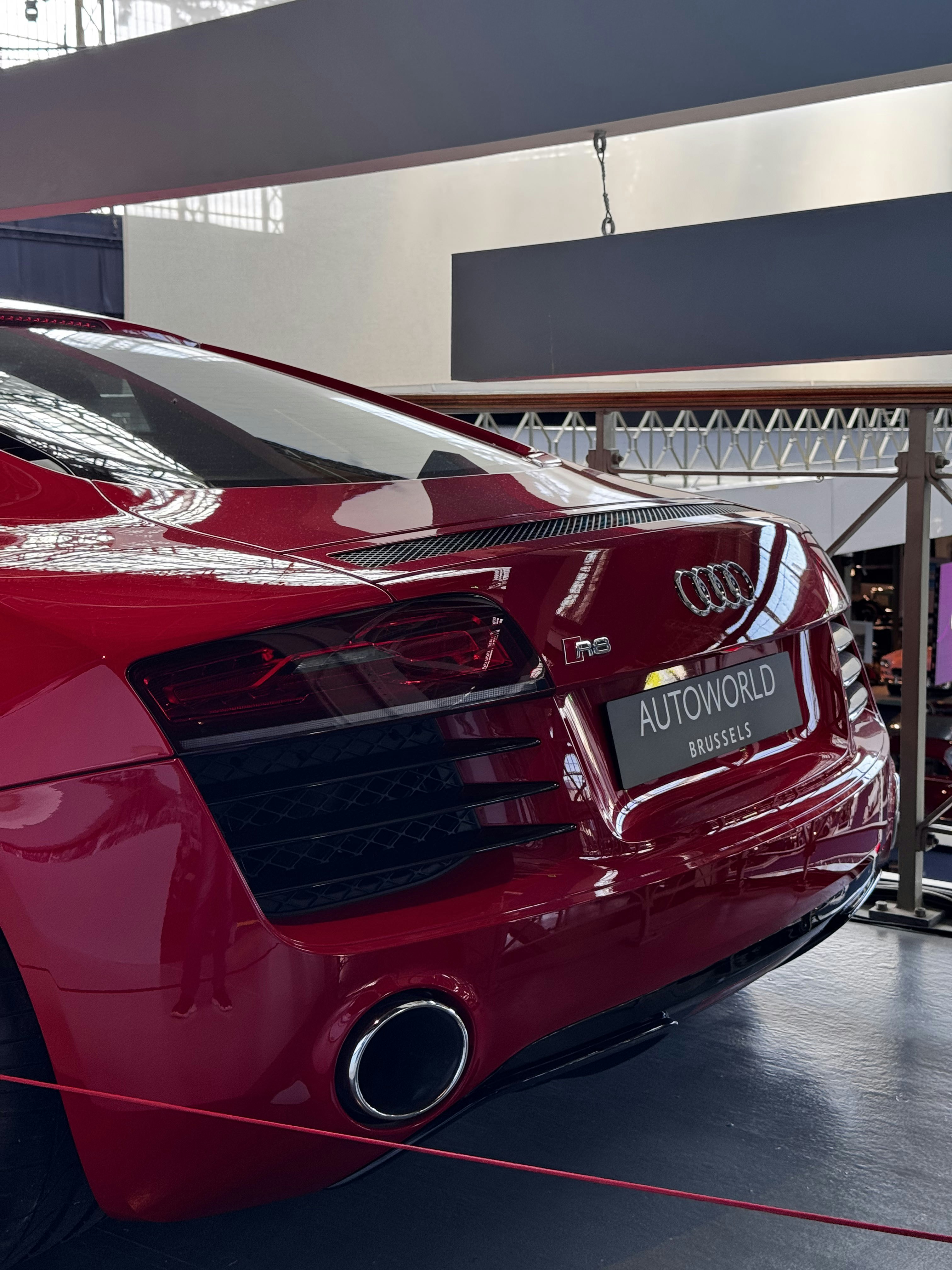 Red Audi R8 at the Brushed Steel Showroom Bar
