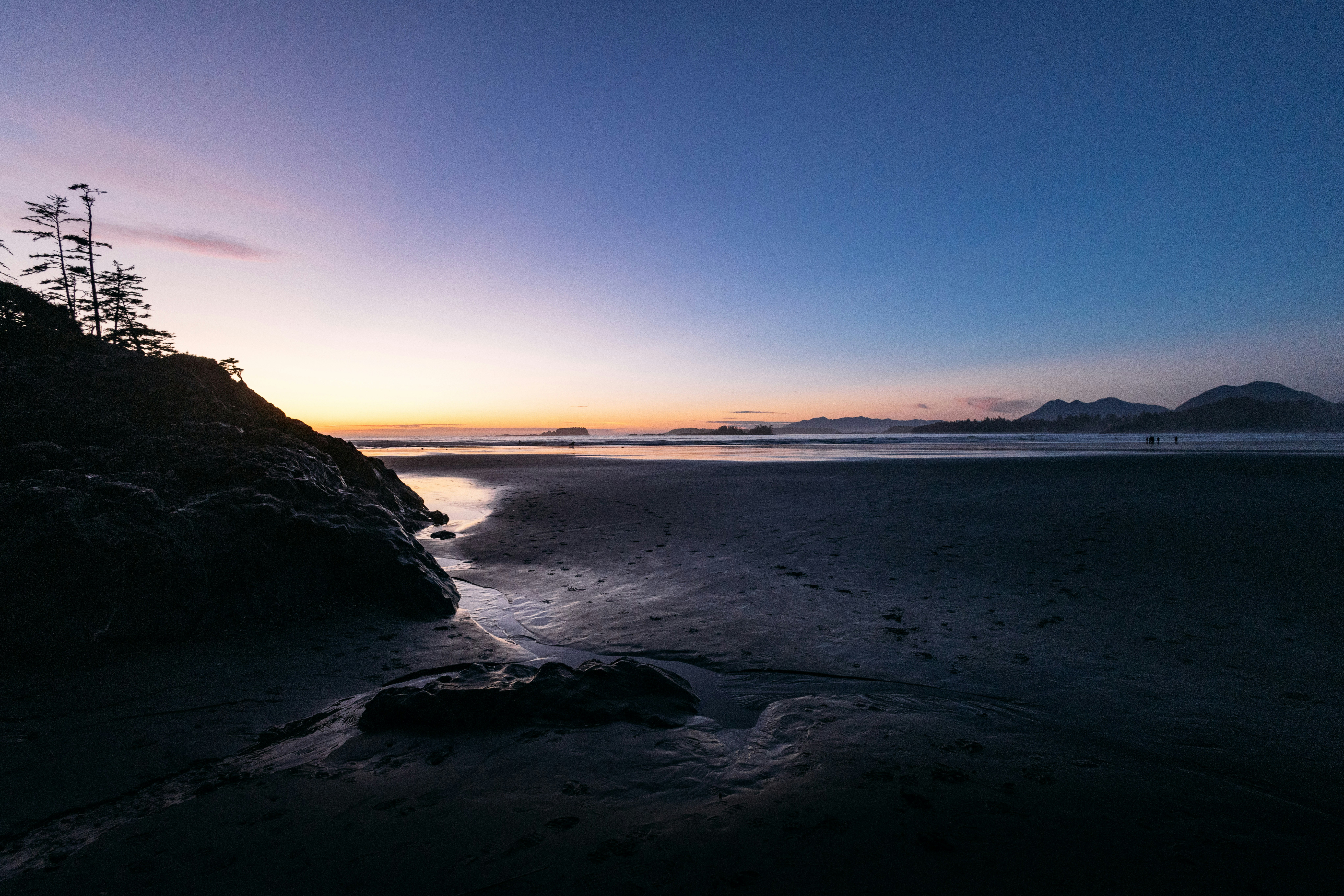 Twilight Shoreline: Quiet Curves of Sand and Sea