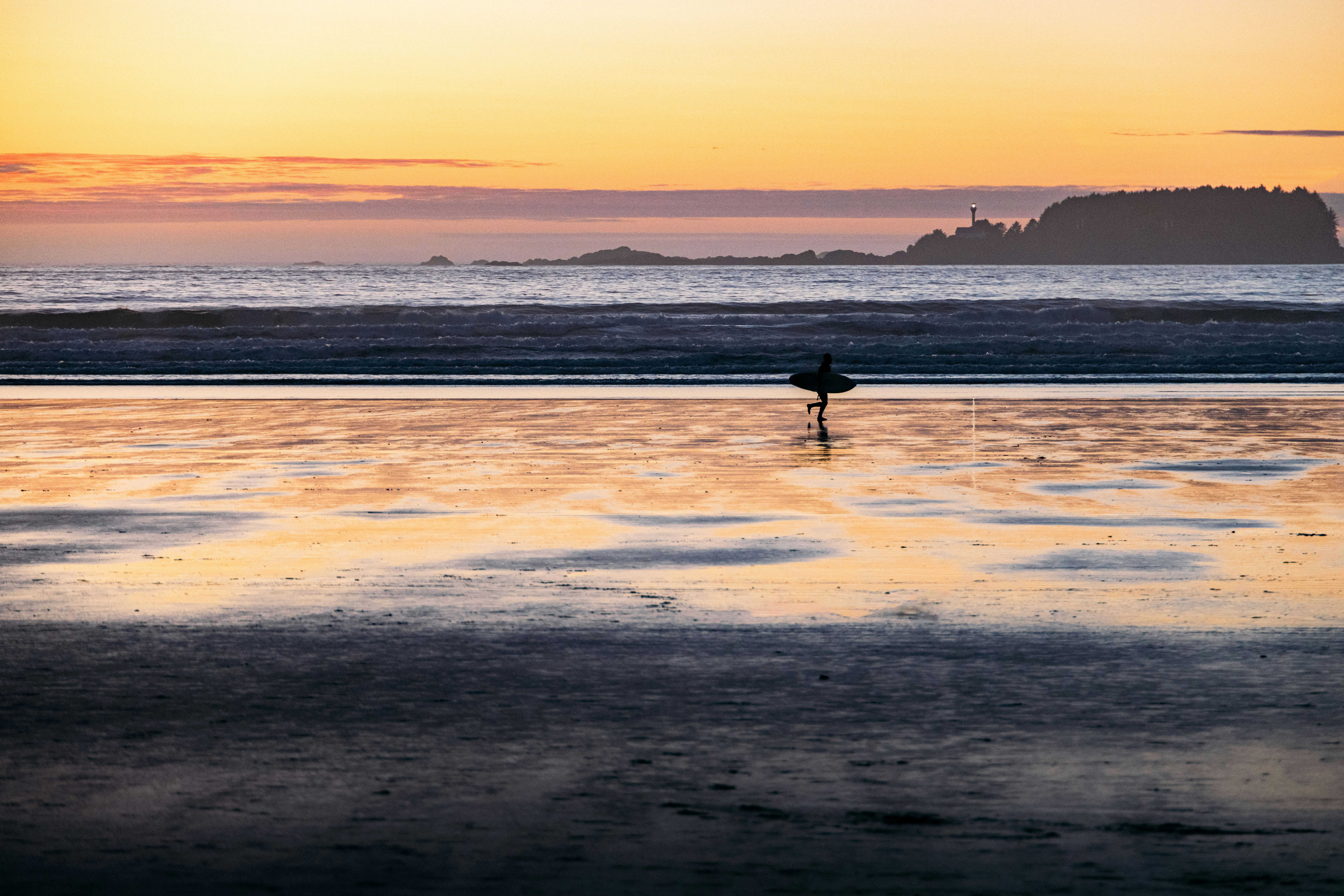 Solitary Surfer at Sunset: Quiet Horizon