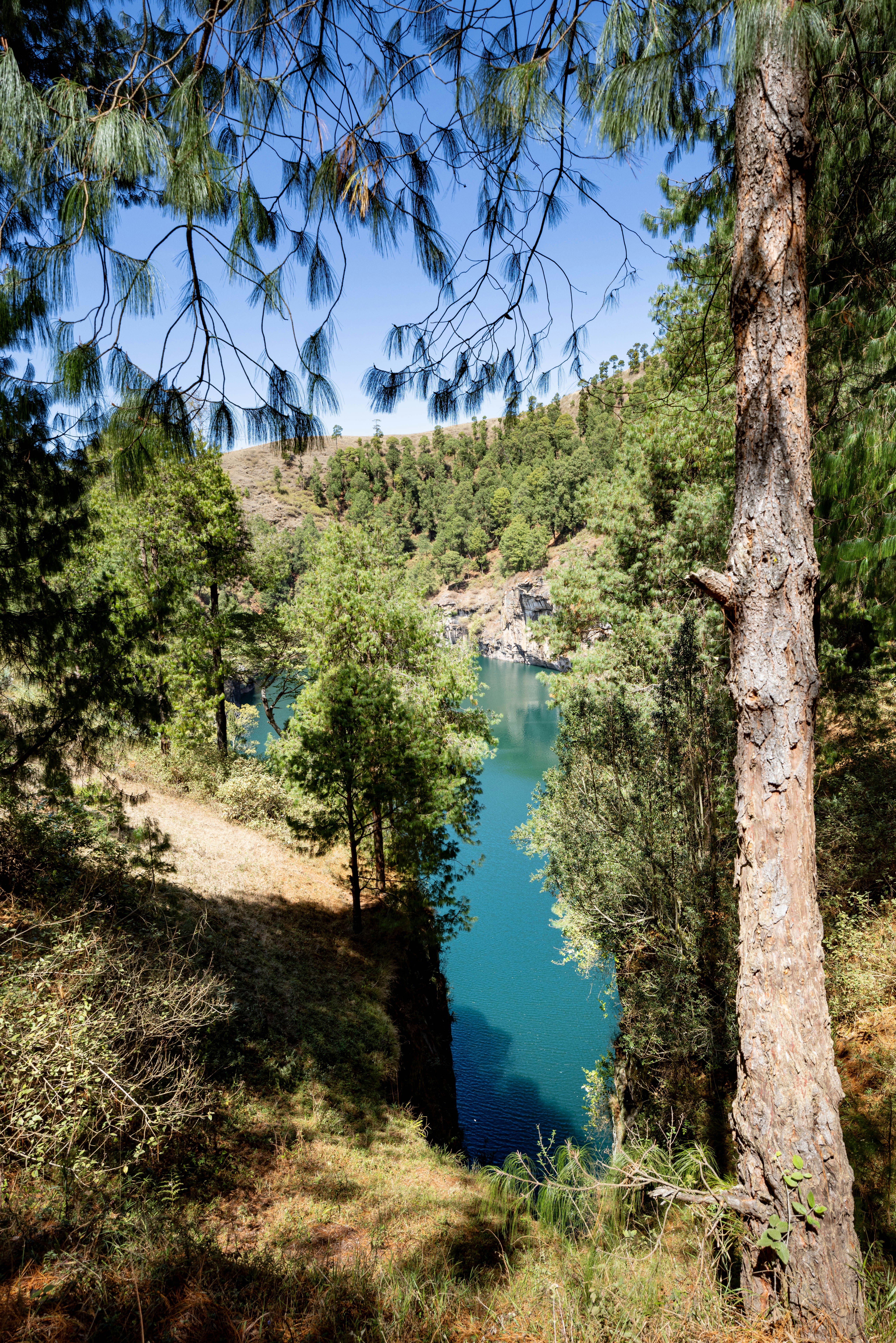 Sunlit Gorge Over Azure Water