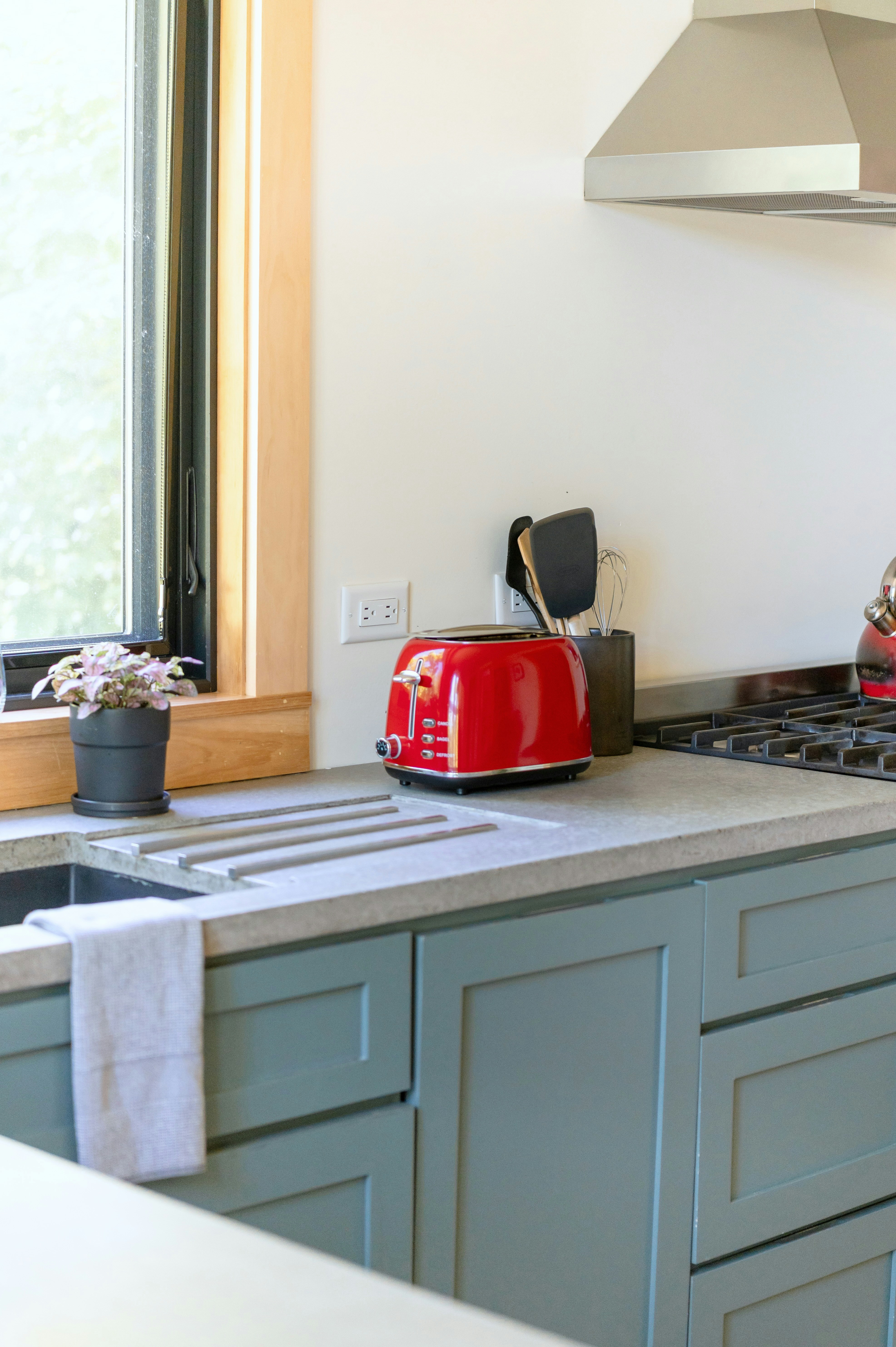 Bright Red Appliance on a Calm Kitchen Counter