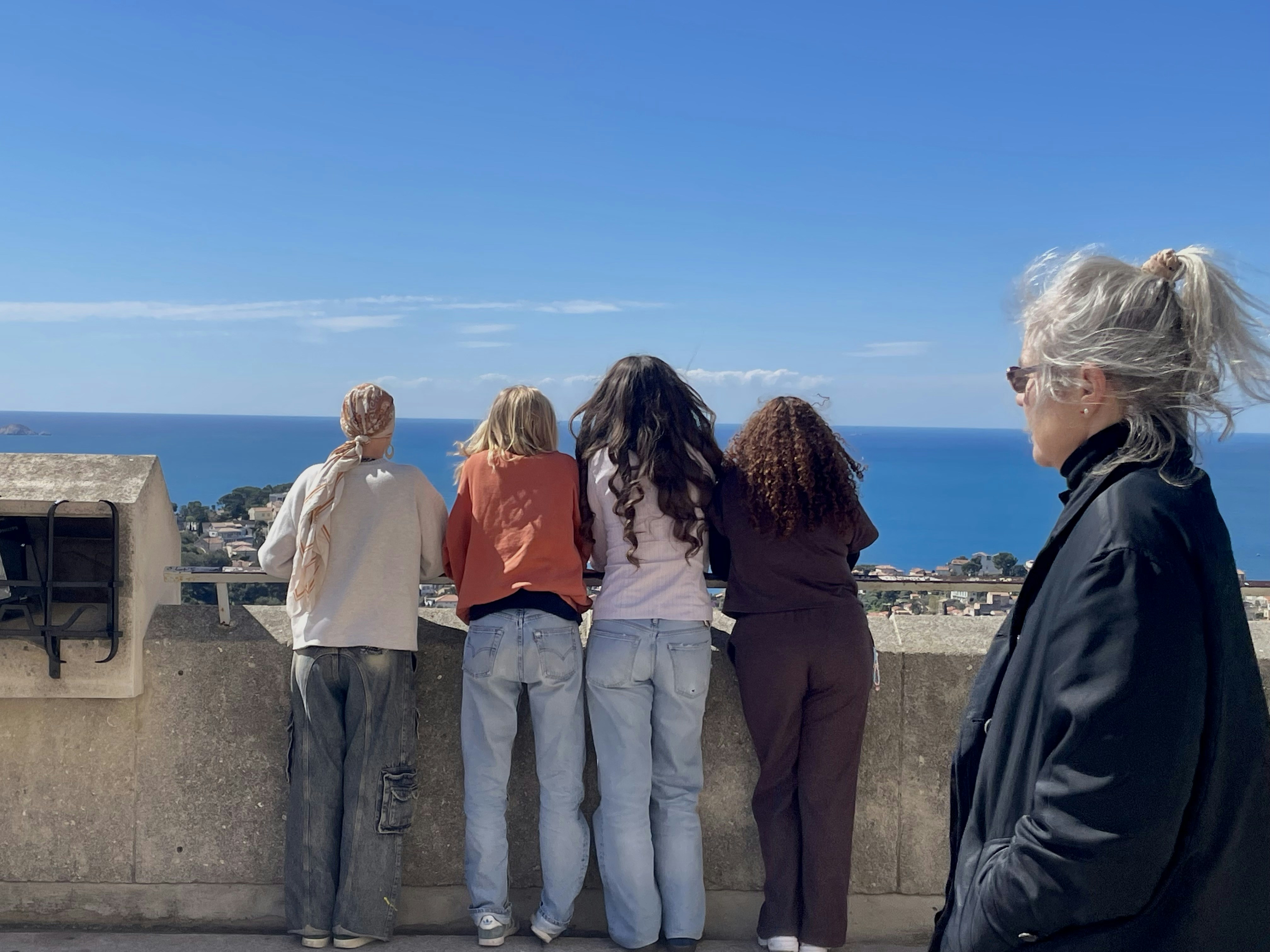 Five Friends on a Sea-View Terrace, Gazing Toward the Horizon