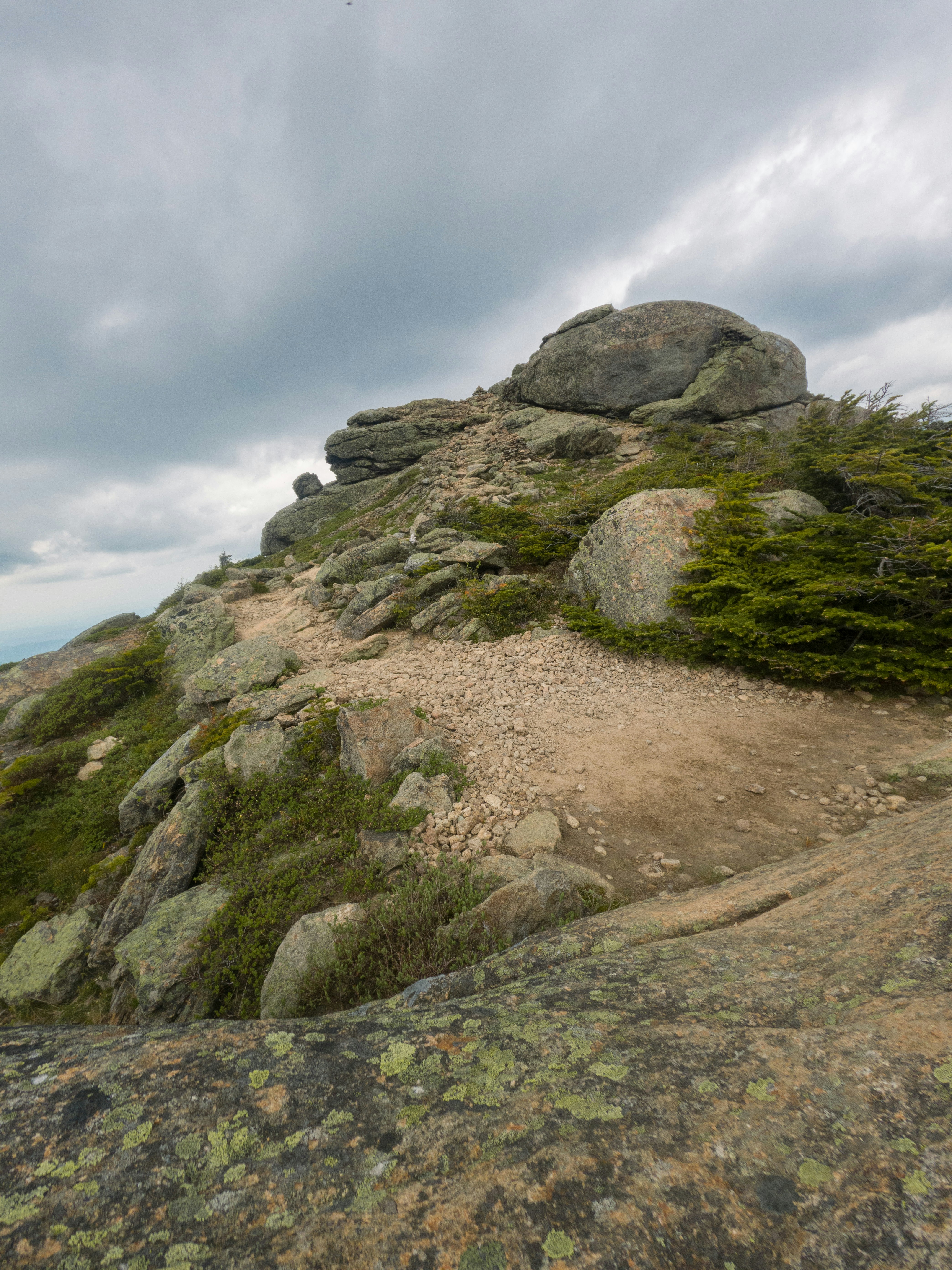 Ridge Path Toward the Peak: A Rough Granite Walk
