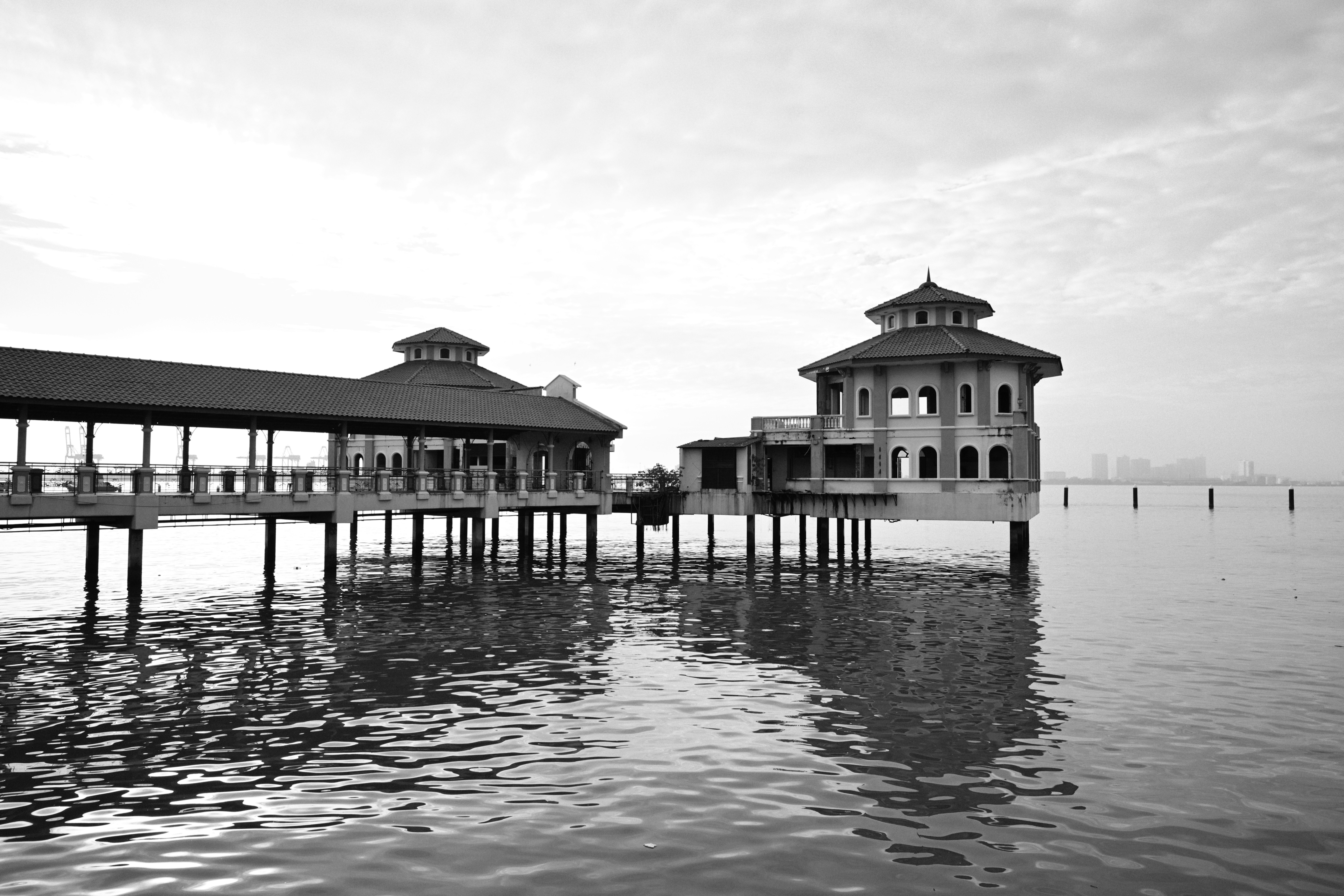 Piered Panorama: A Symmetry of Towers Over Calm Waters