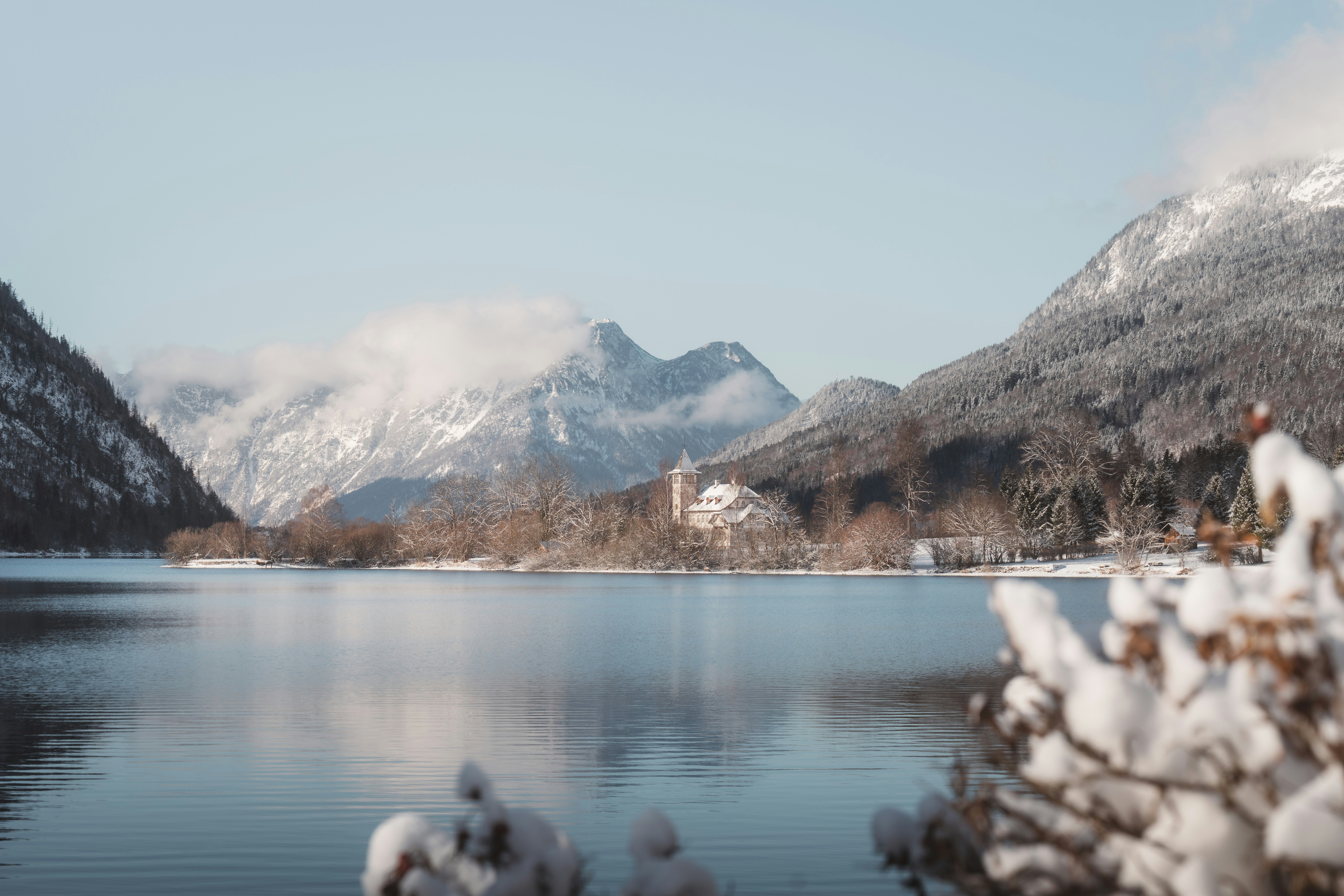 Snow-Capped Peaks Across a Quiet Lake at Dusk