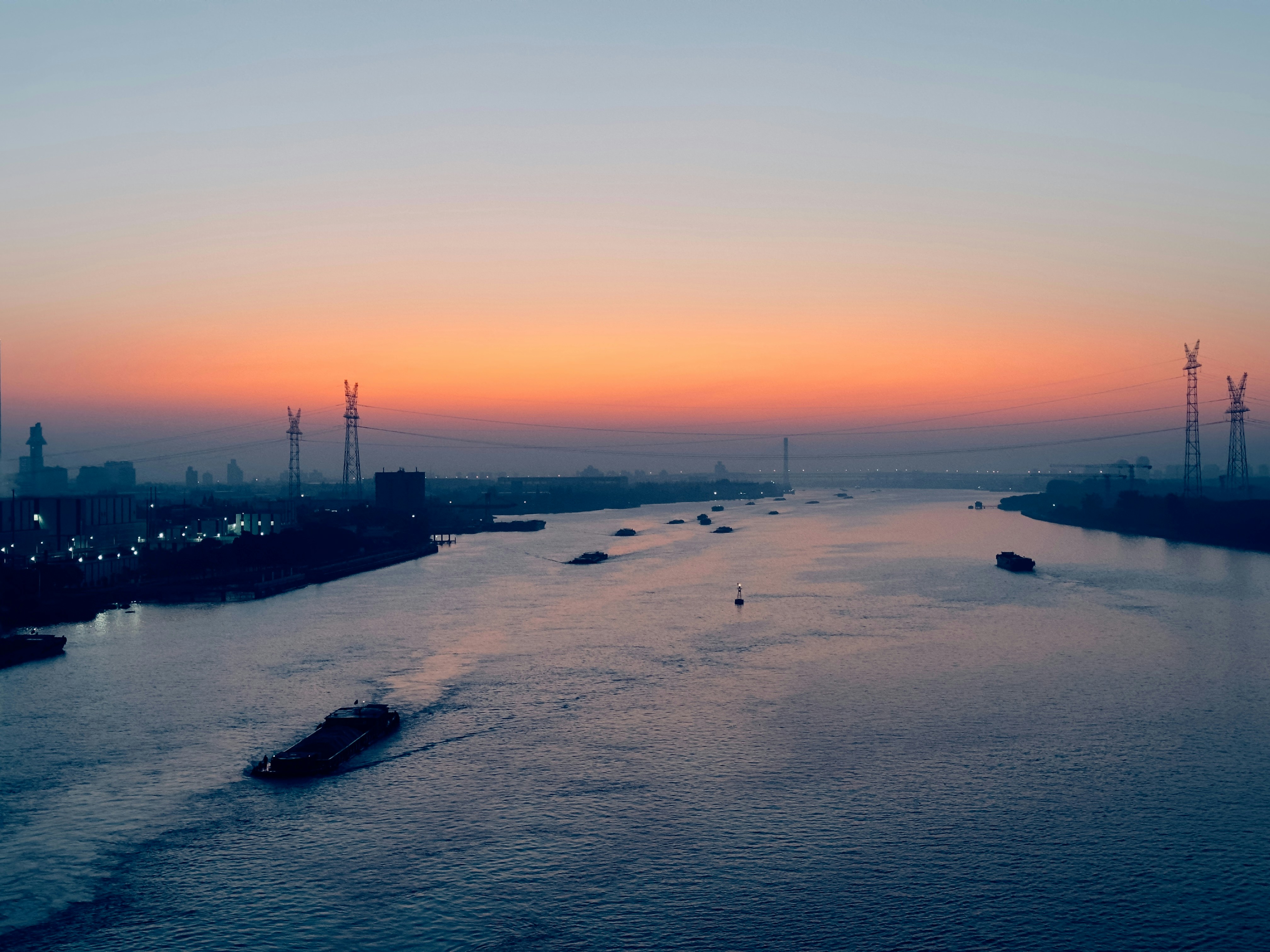 Sunset River Corridor: A Quiet Convergence of Water and Sky