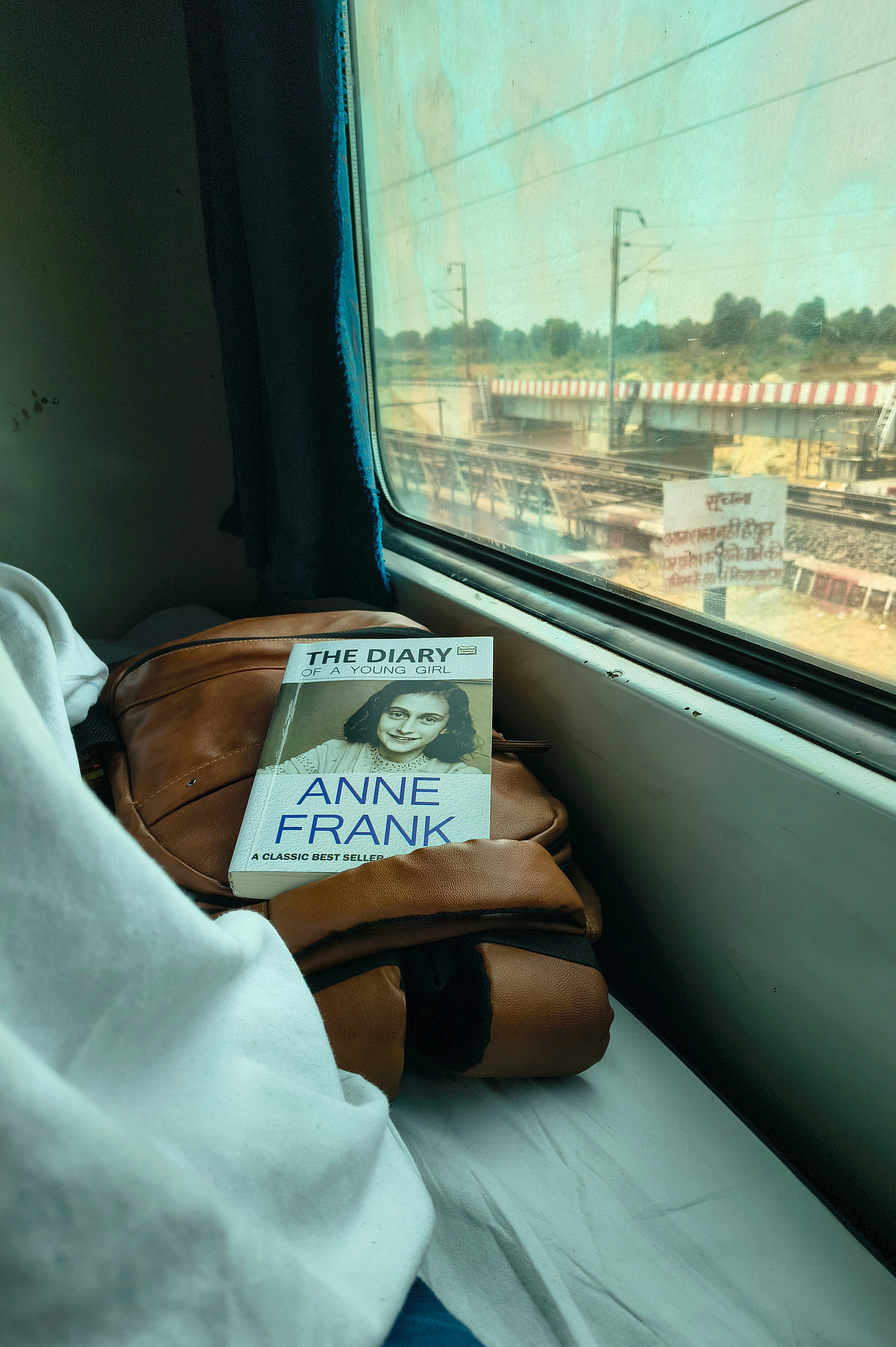 Onboard Reading: A Quiet Moment by the Window