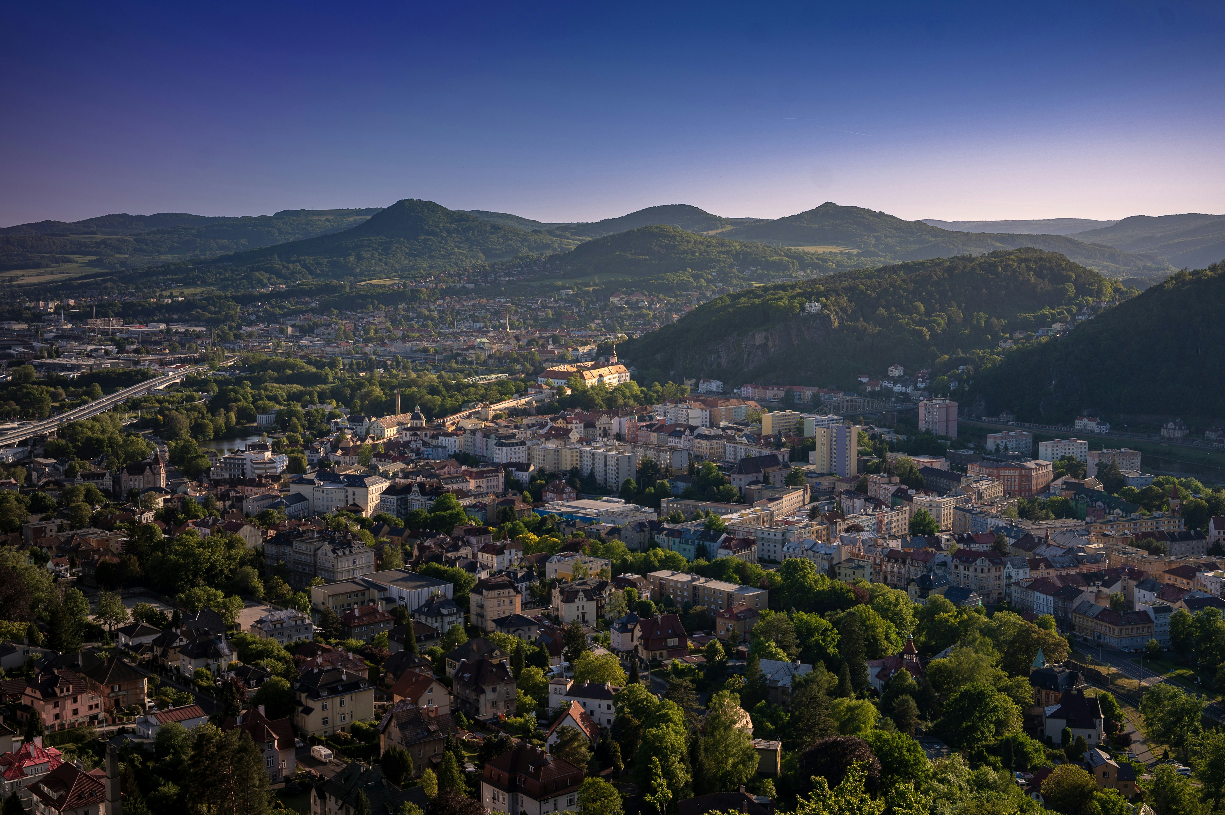 Sunlit Hills Over a Quiet Town