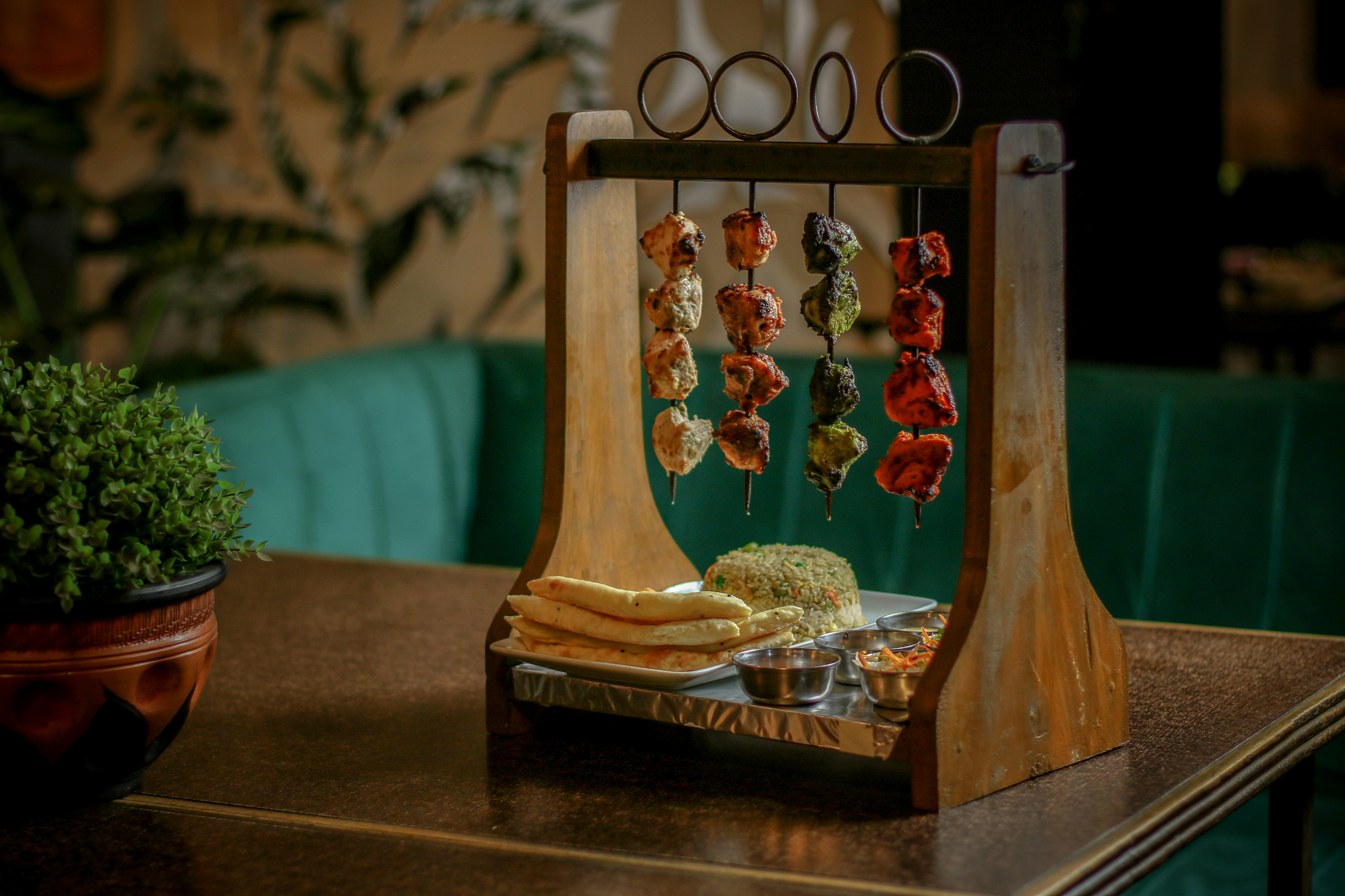Skewered Delights on a Rustic Carving Frame