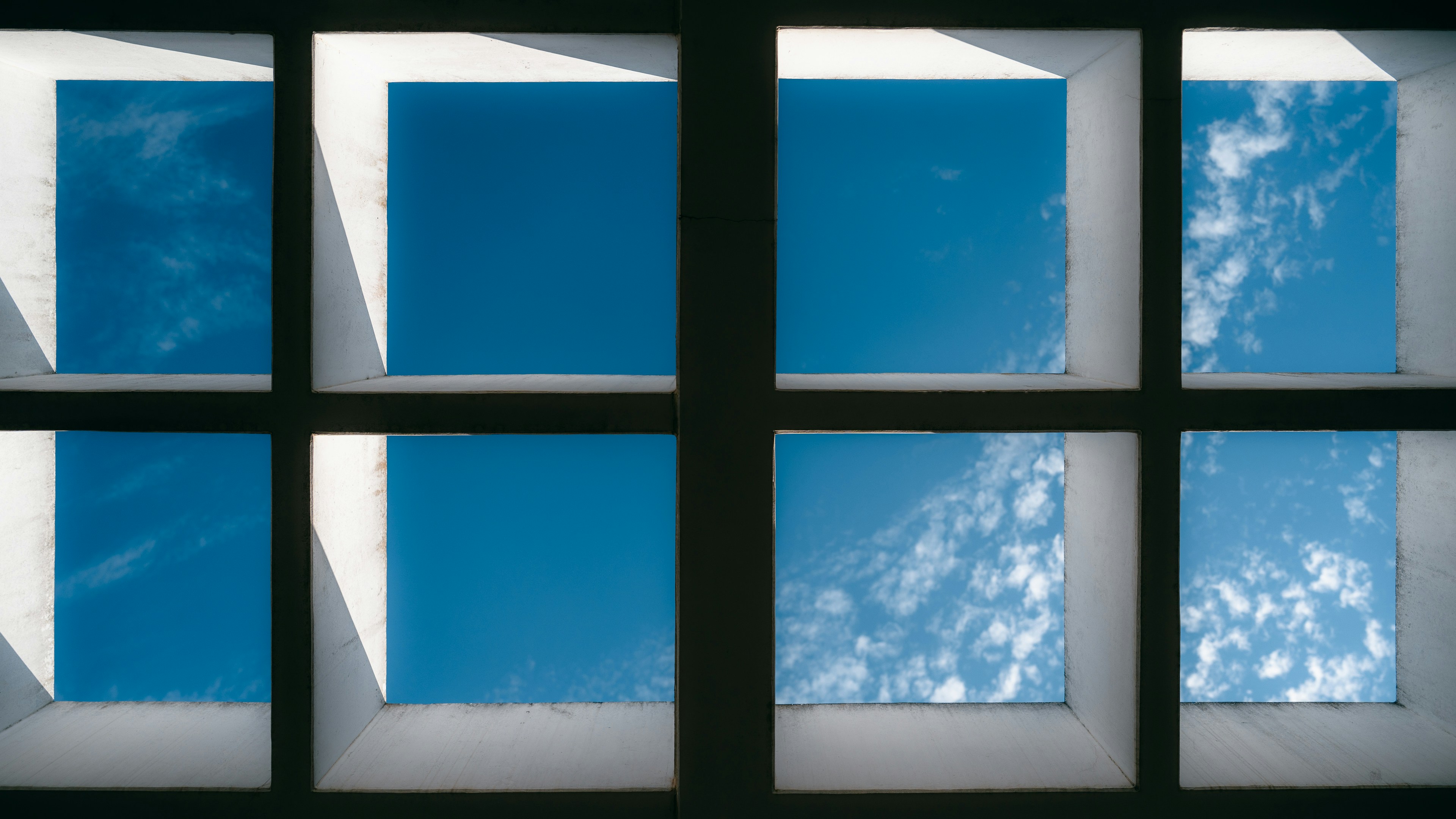 Skyward Grids: Windows to a Bright Day