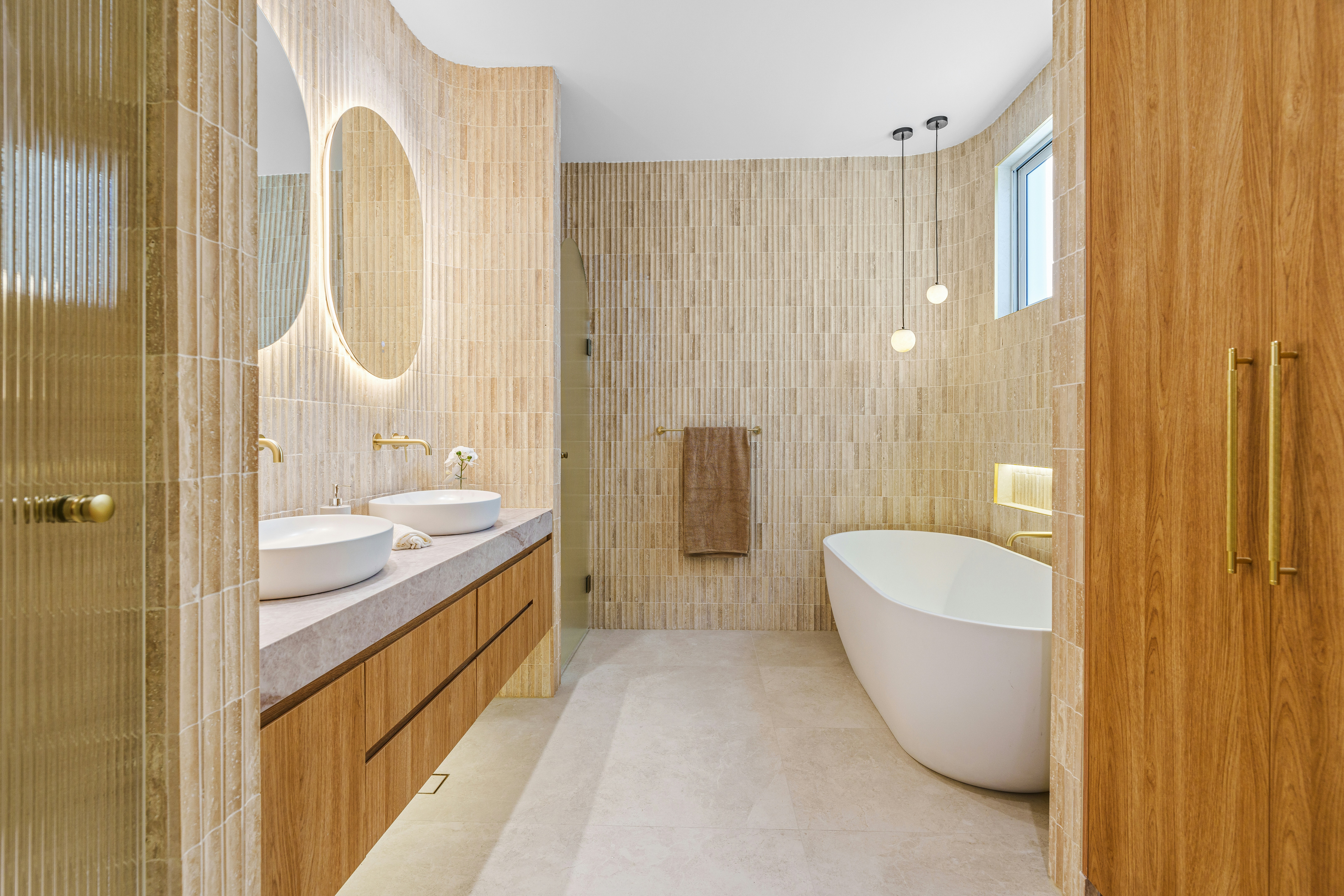 Minimalist Spa Bathroom with Freestanding Bathtub and Double Vanity