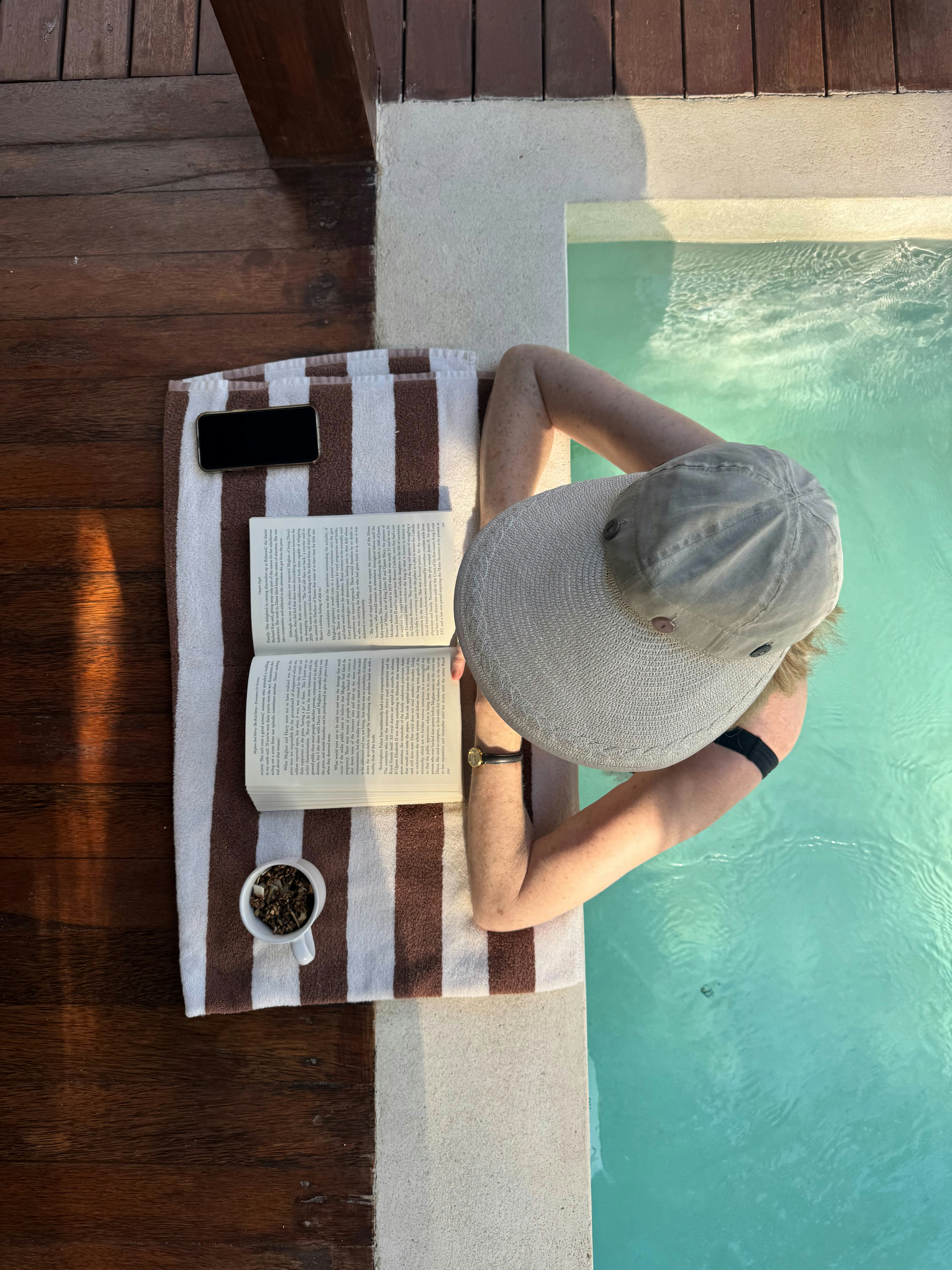 Poolside Reader Under a Sunhat