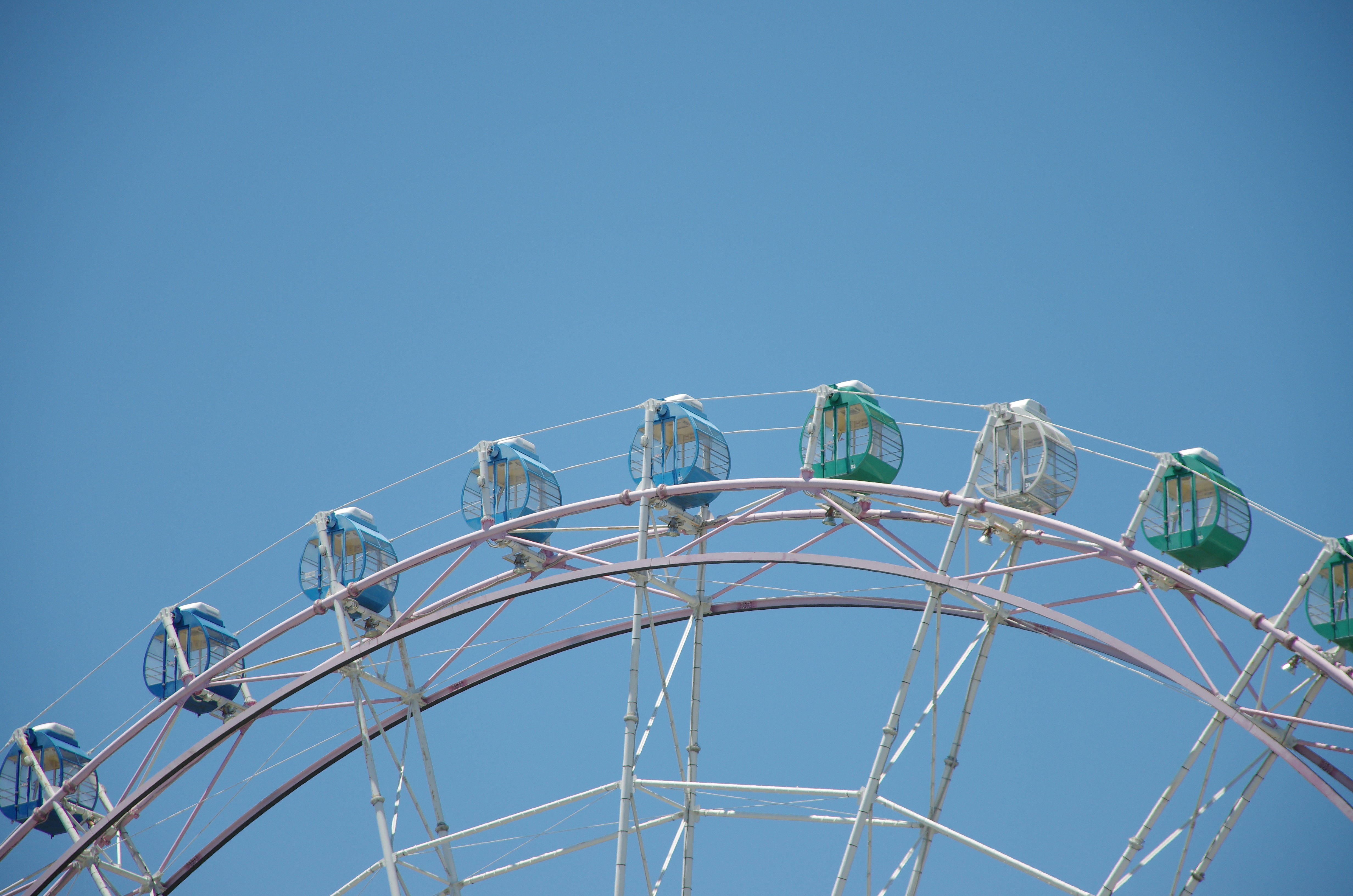 Blue Sky Above the Ferris Wheel Arc