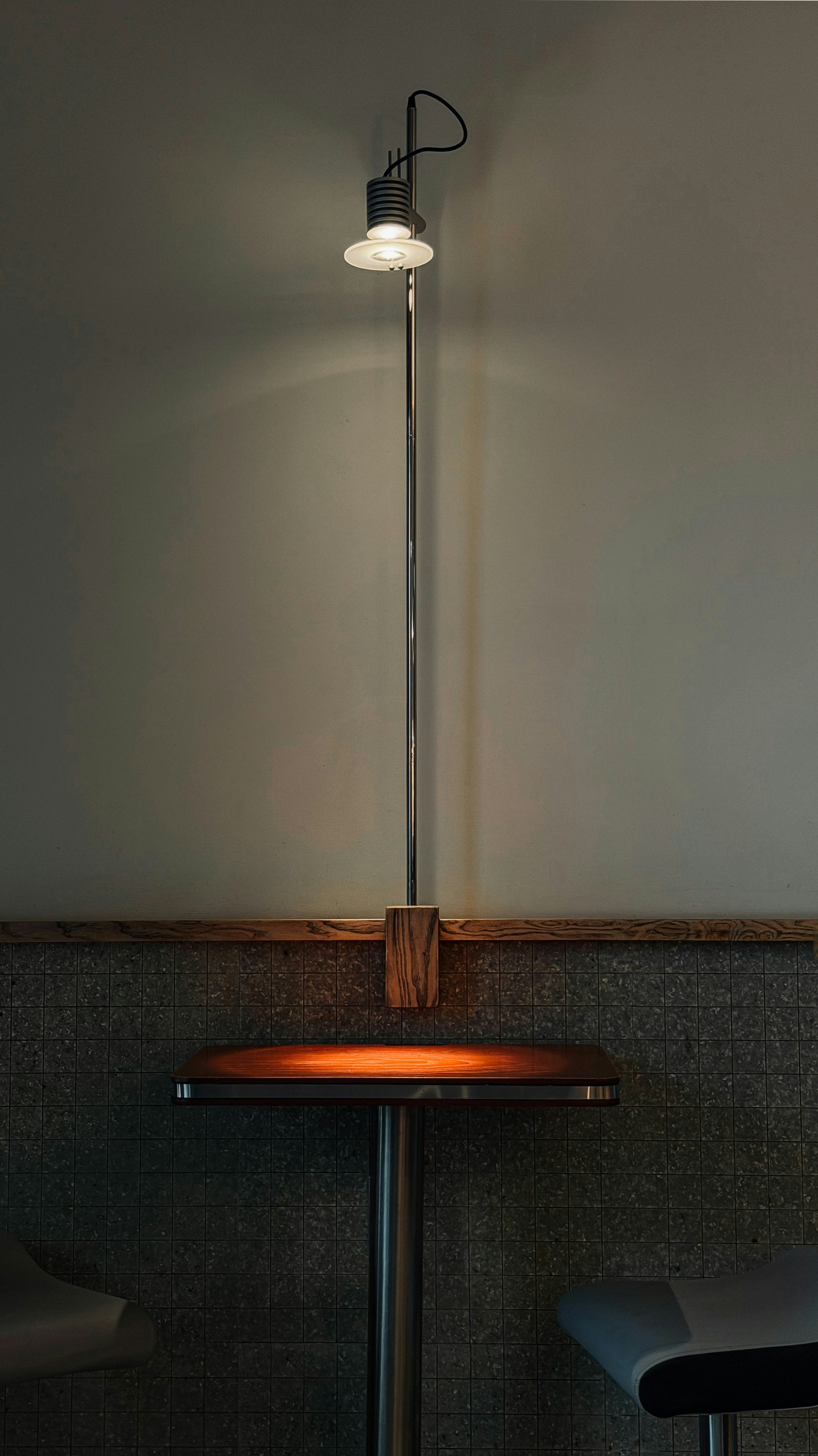 Minimalist Lamp Stand Illuminates Quiet Corner