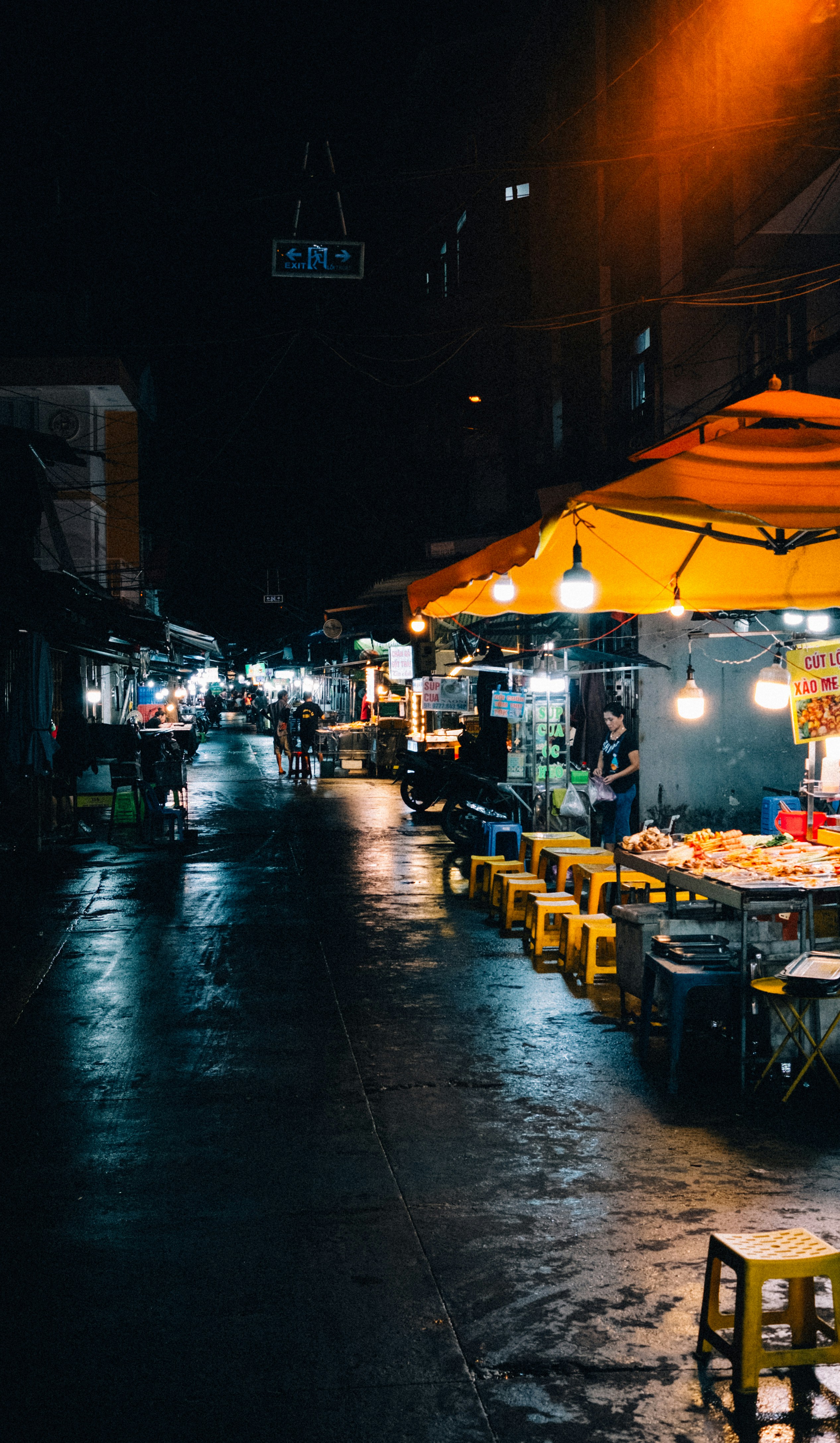 Night Market Canvas: Warm Neon Under a Yellow Canopy