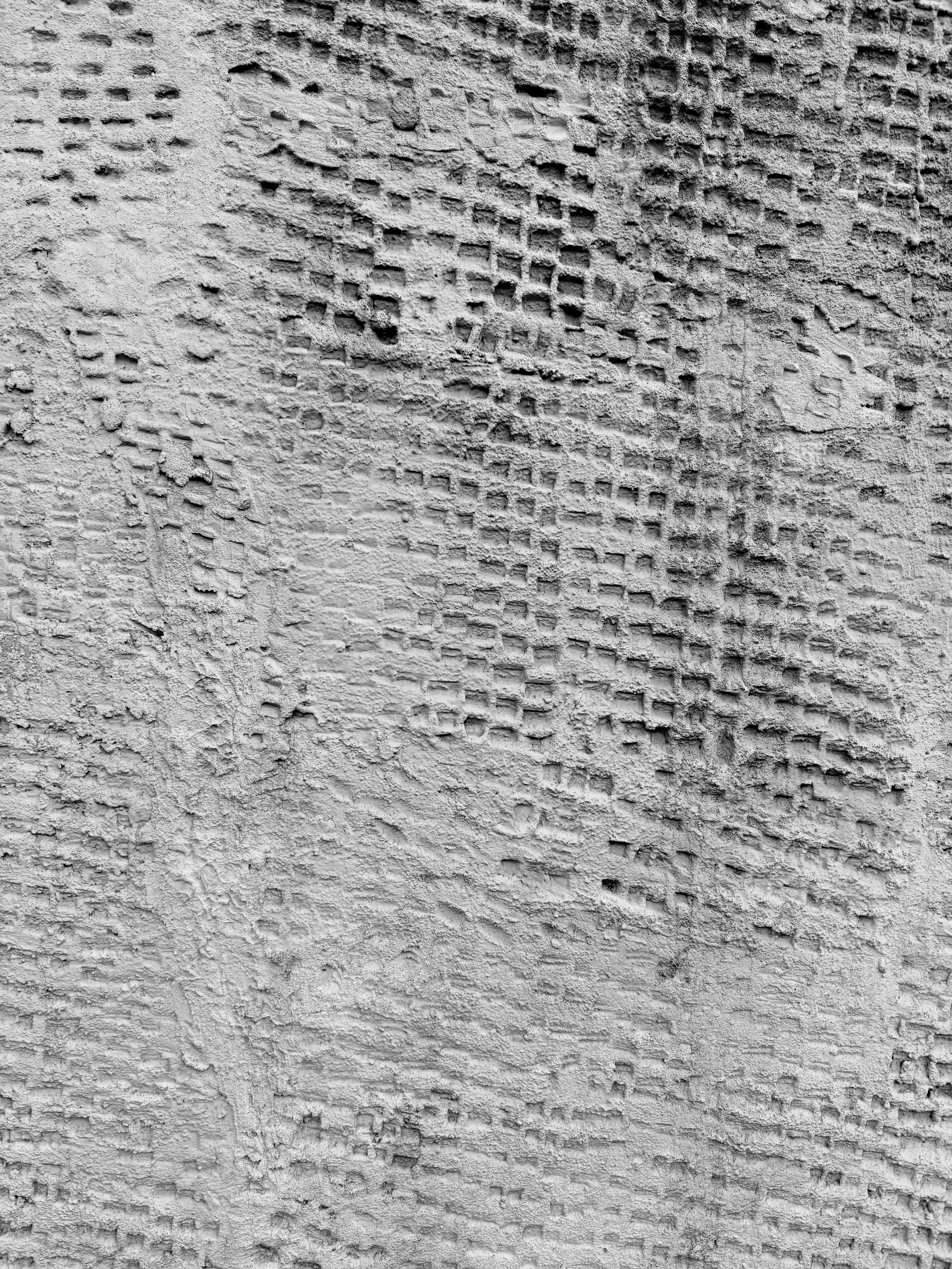 Textured Canvas: A Close-Up of Abstract Grooves in Gray Terrain