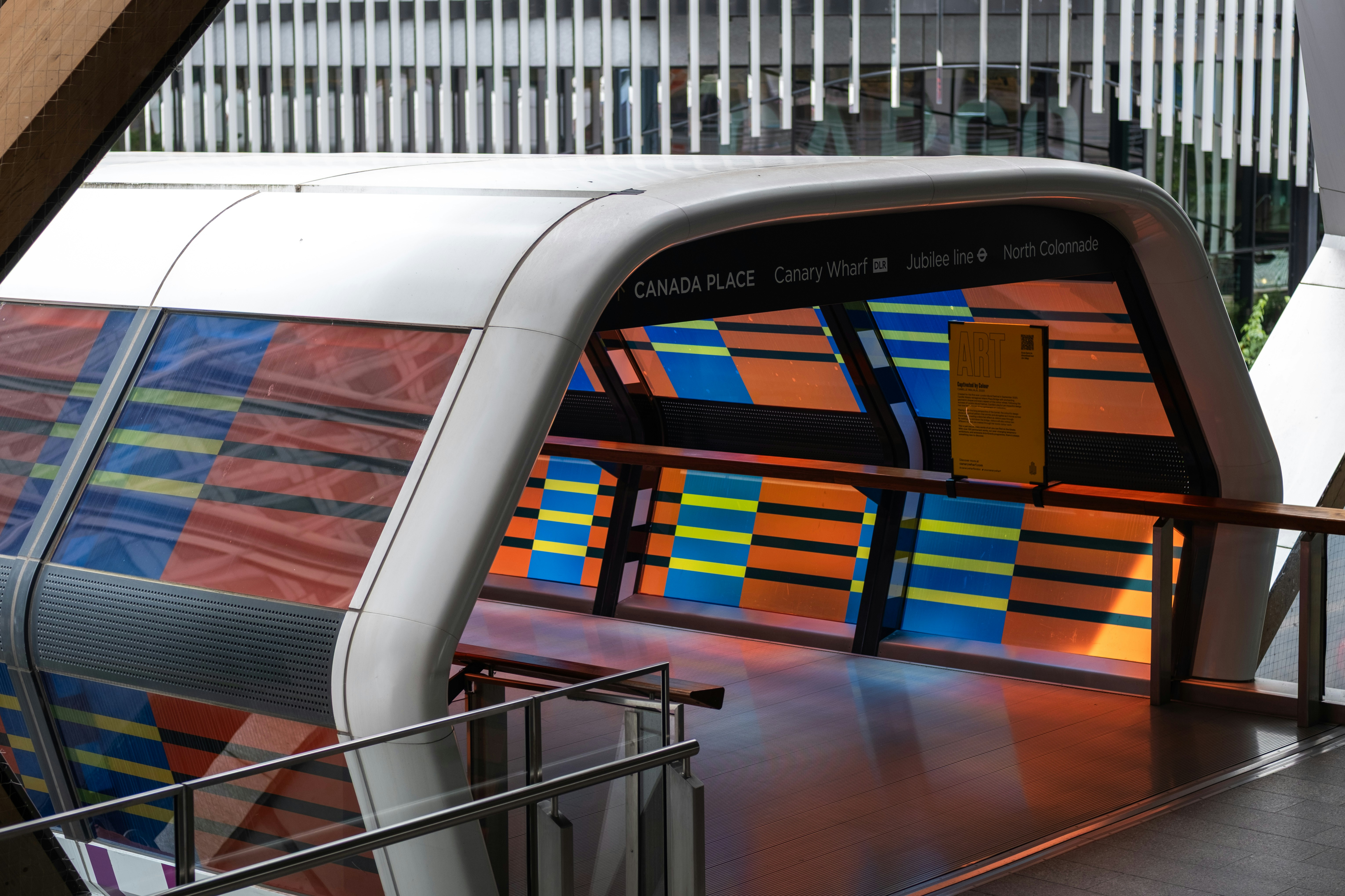 Color-Striped Portal: Inside a Futuristic Transit Station