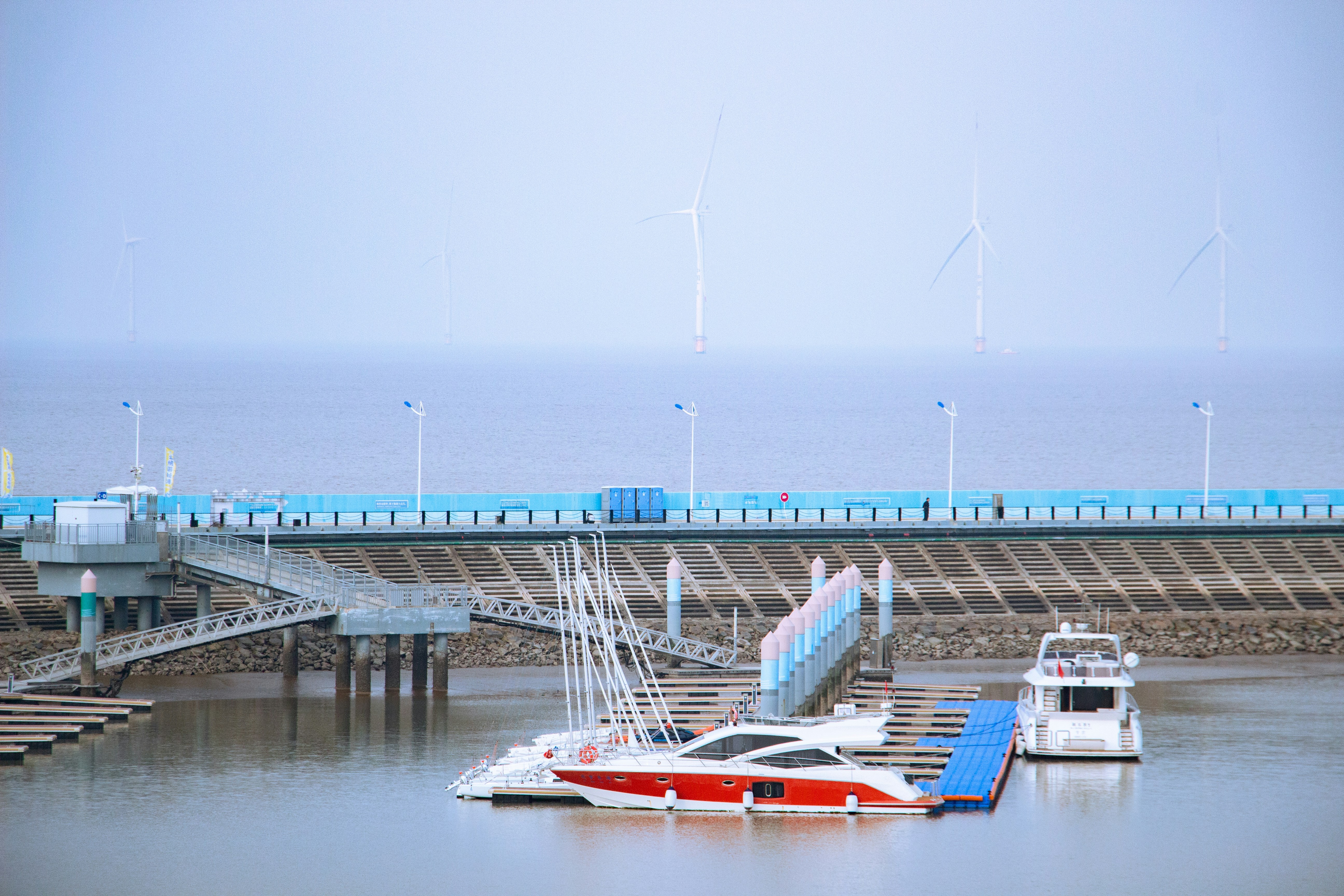  Harbour Sketch: Boats, Docks and Wind Turbines on a Calm Sea
