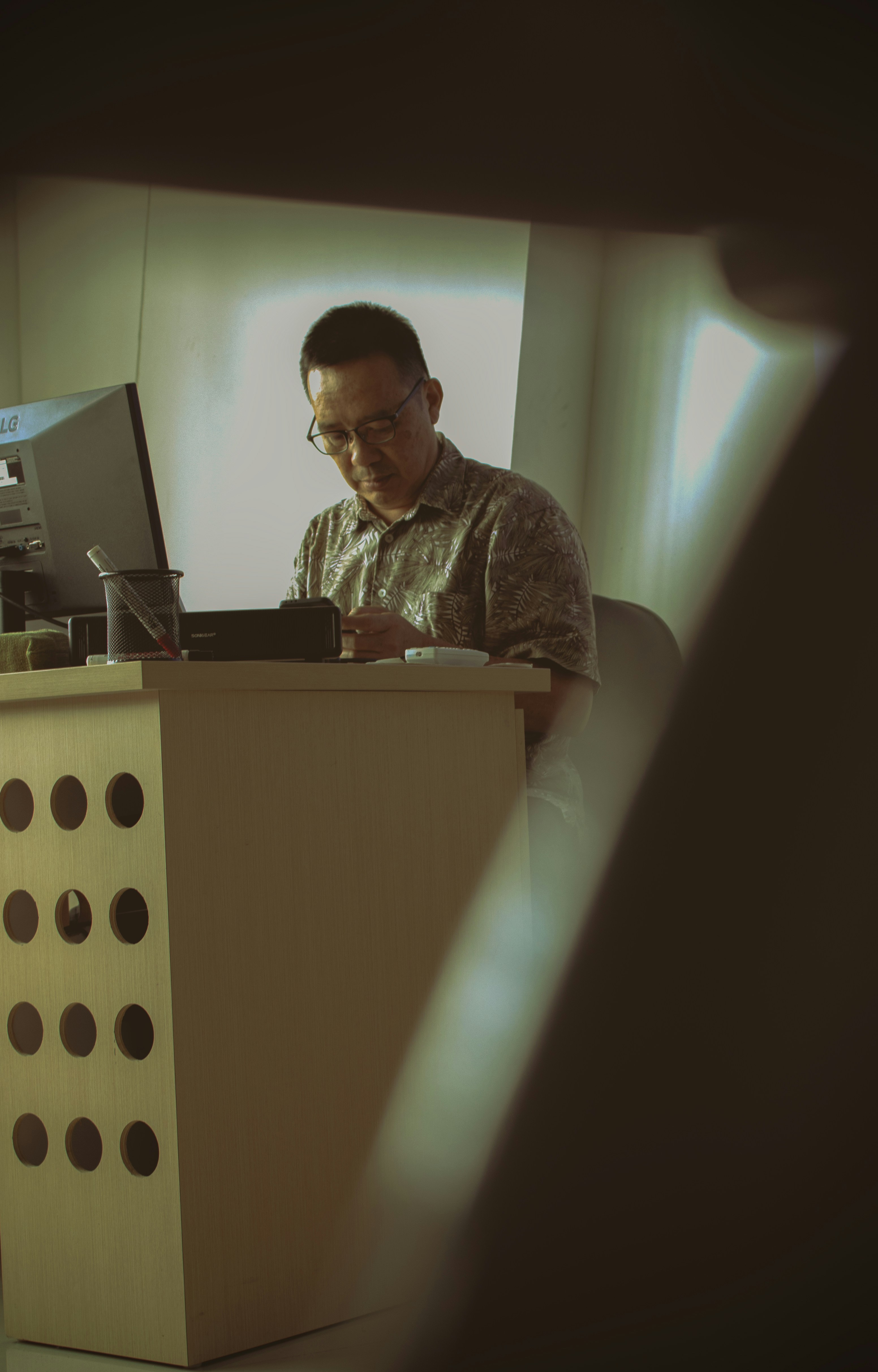 In-Office Focus: A Quiet Moment at the Desk