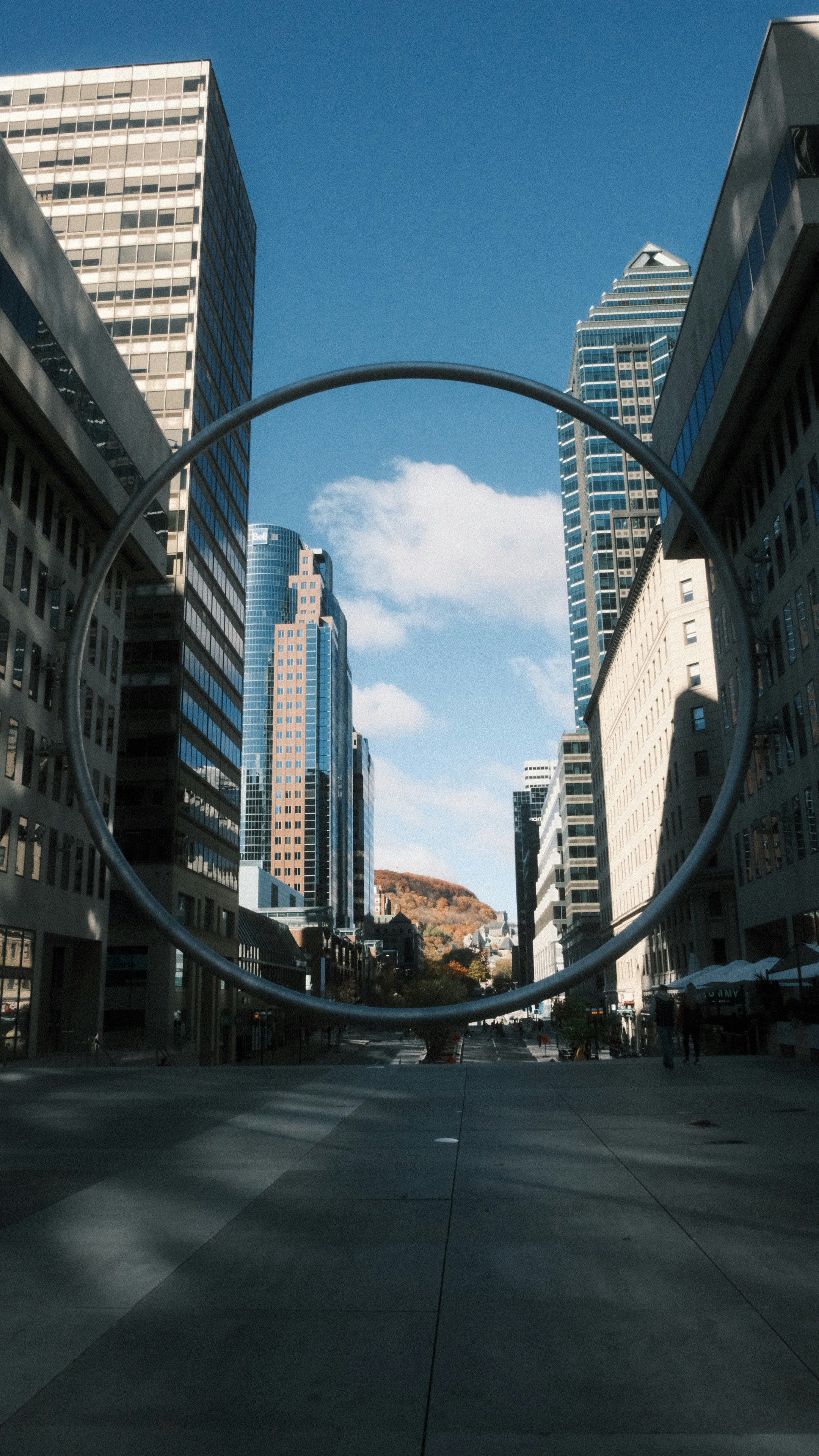 Circular Frame Through a City Canyon