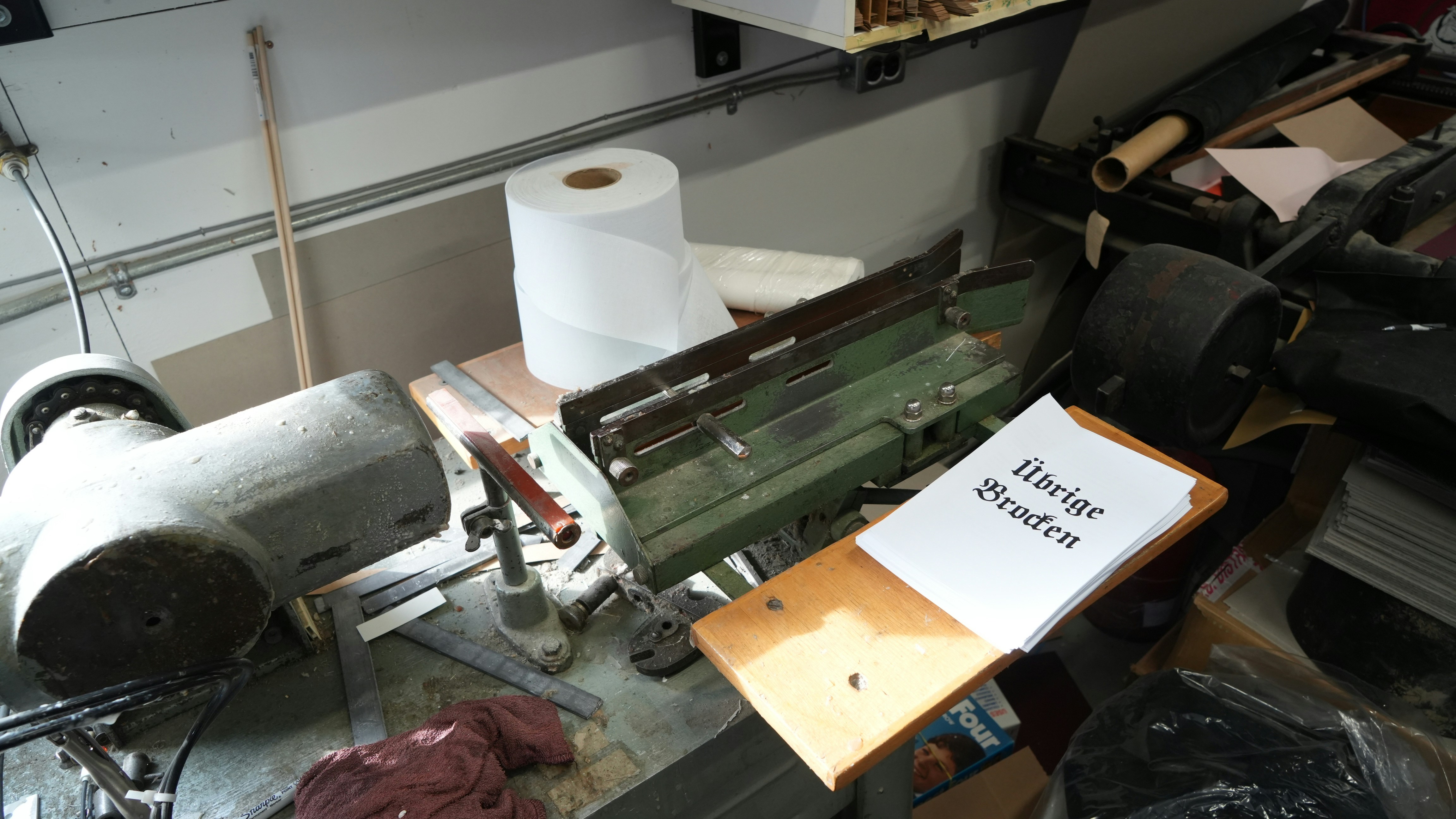 Close up of a Hutterite bookbinding shop, printing in traditional German blackletter