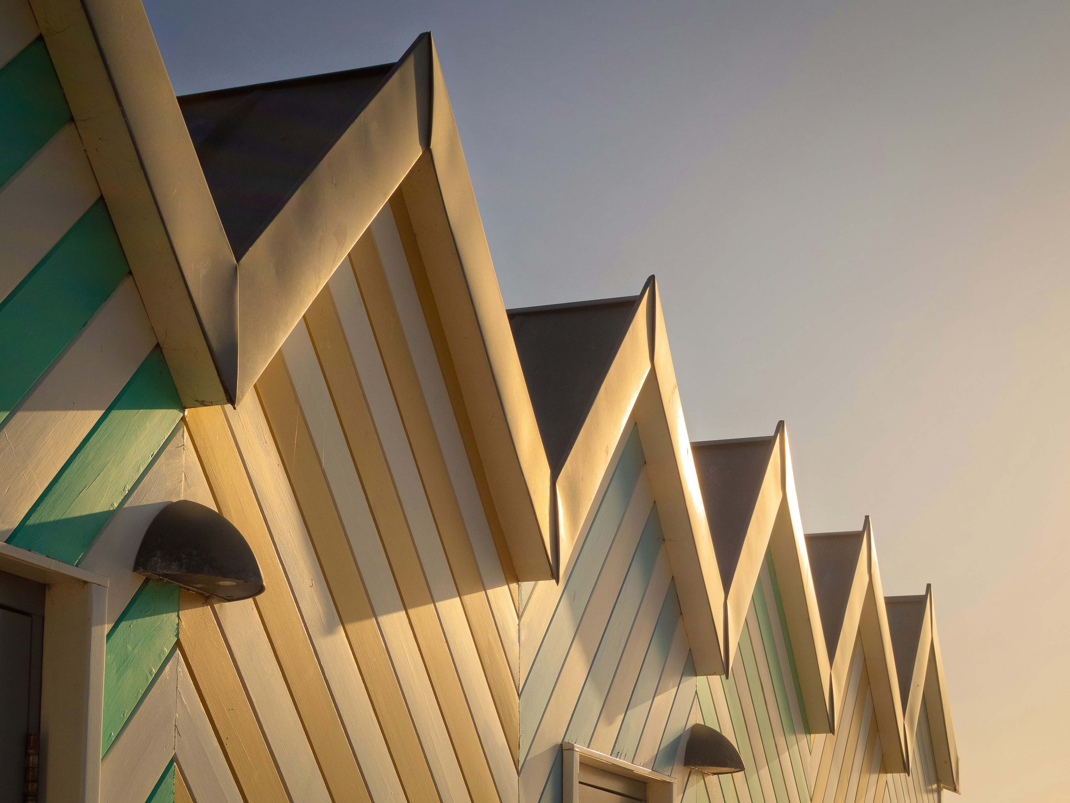 Zigzag Facade: Sunlit Angles on a Modern Archway