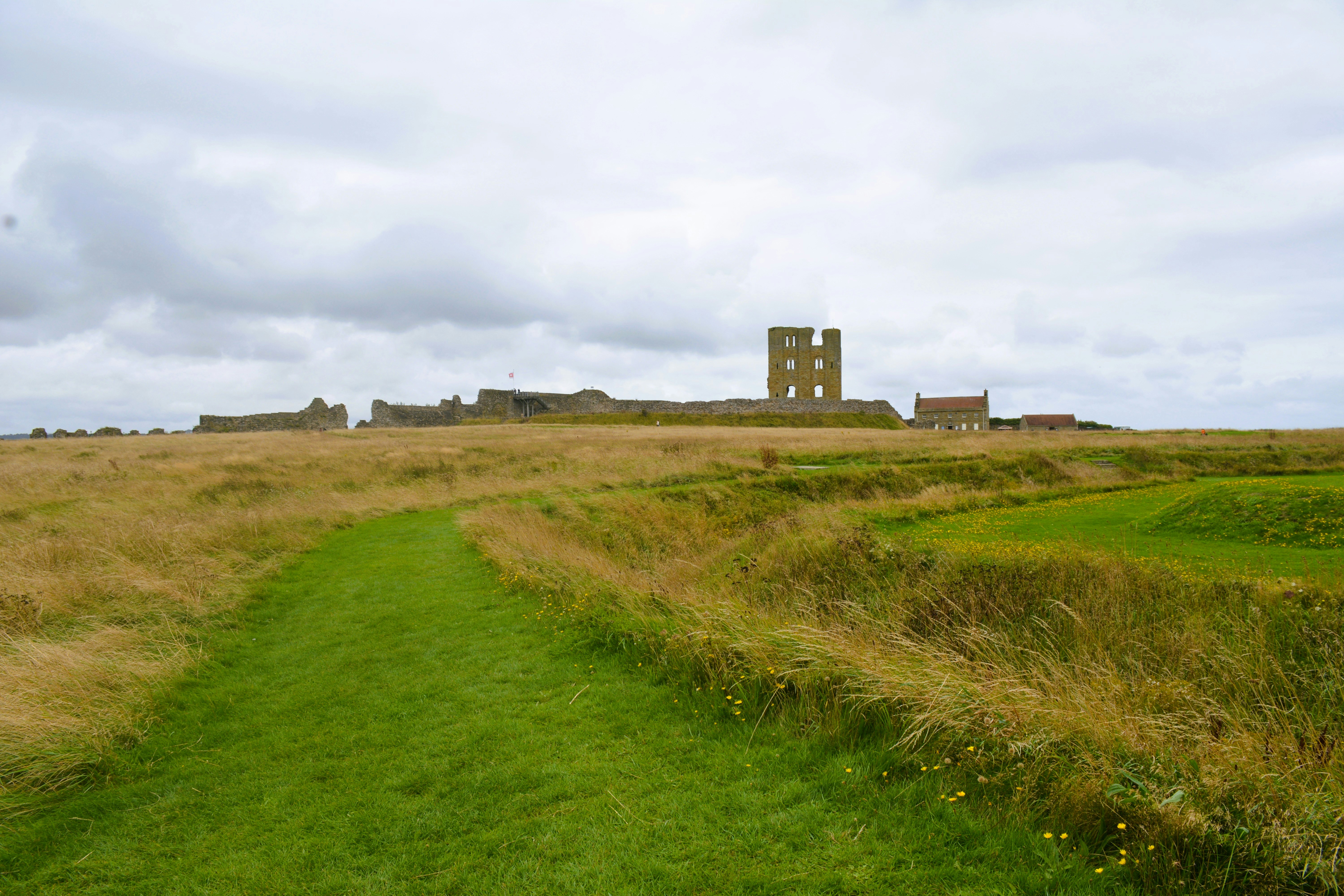 Ruined Tower on the Horizon: A Quiet Coastal Plain