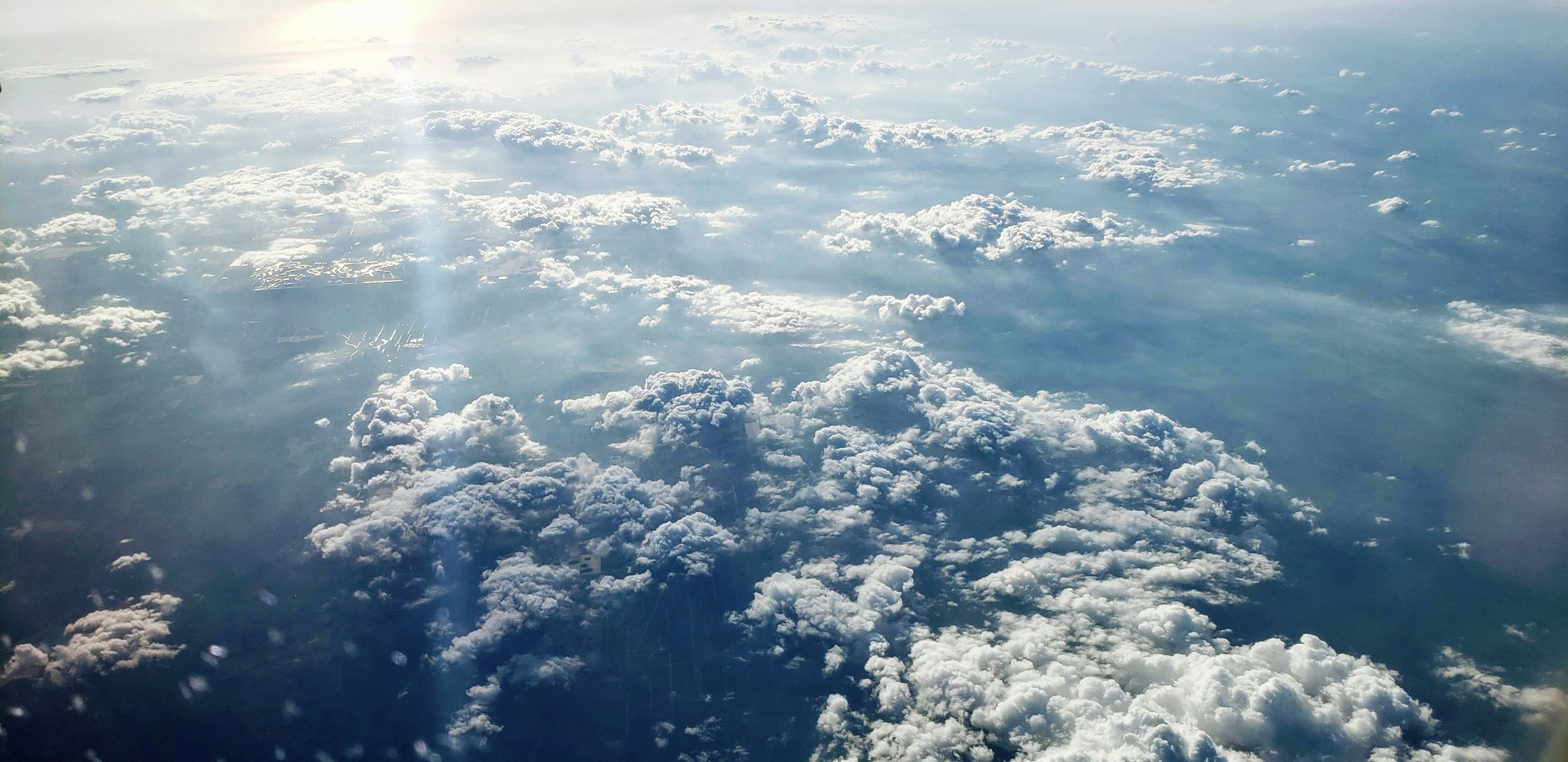 Above the Clouded Ocean: A Dawn-Lit Sea of Clouds