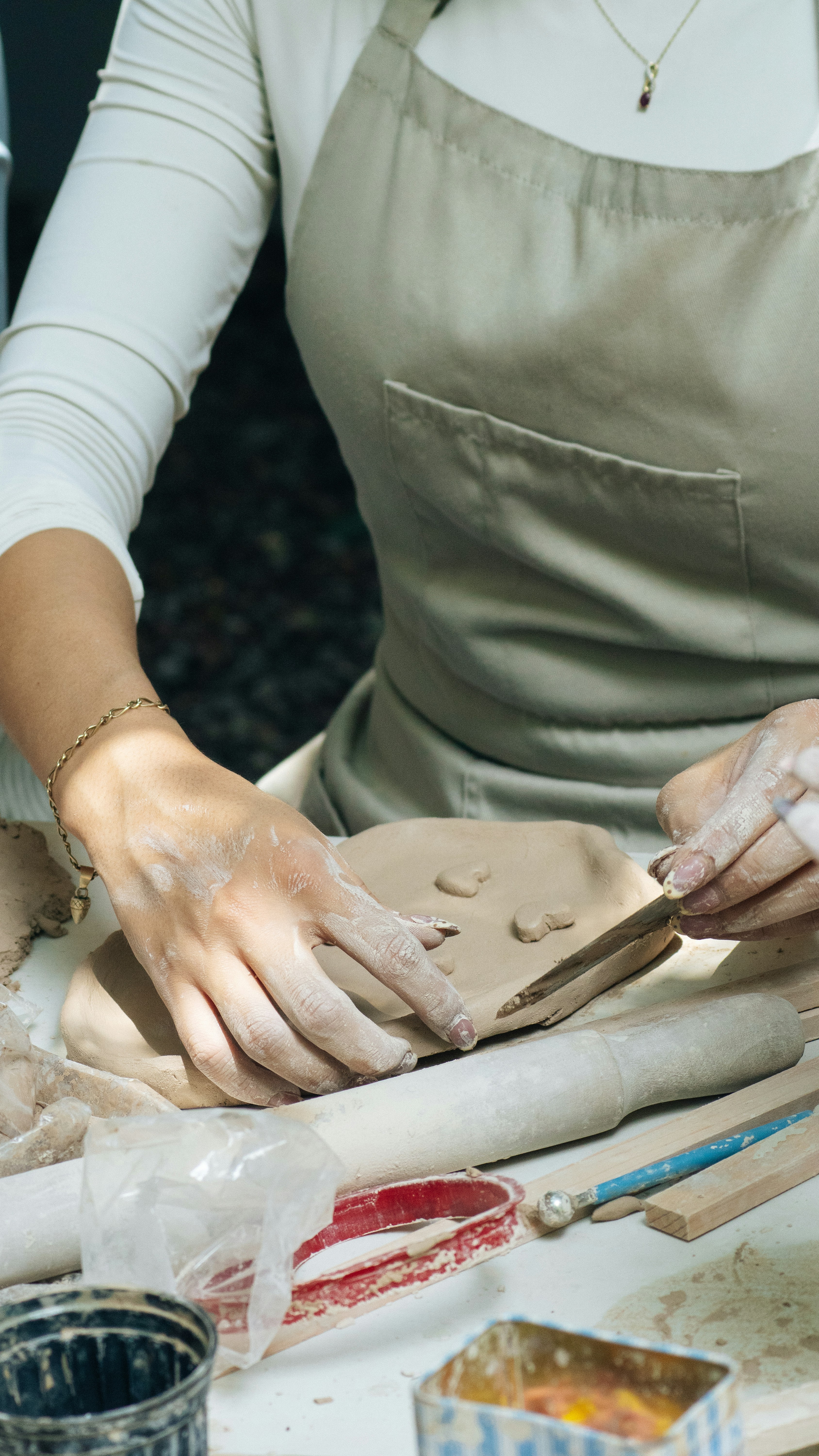 Hands at Work: Crafting Clay in Quiet Studio Light