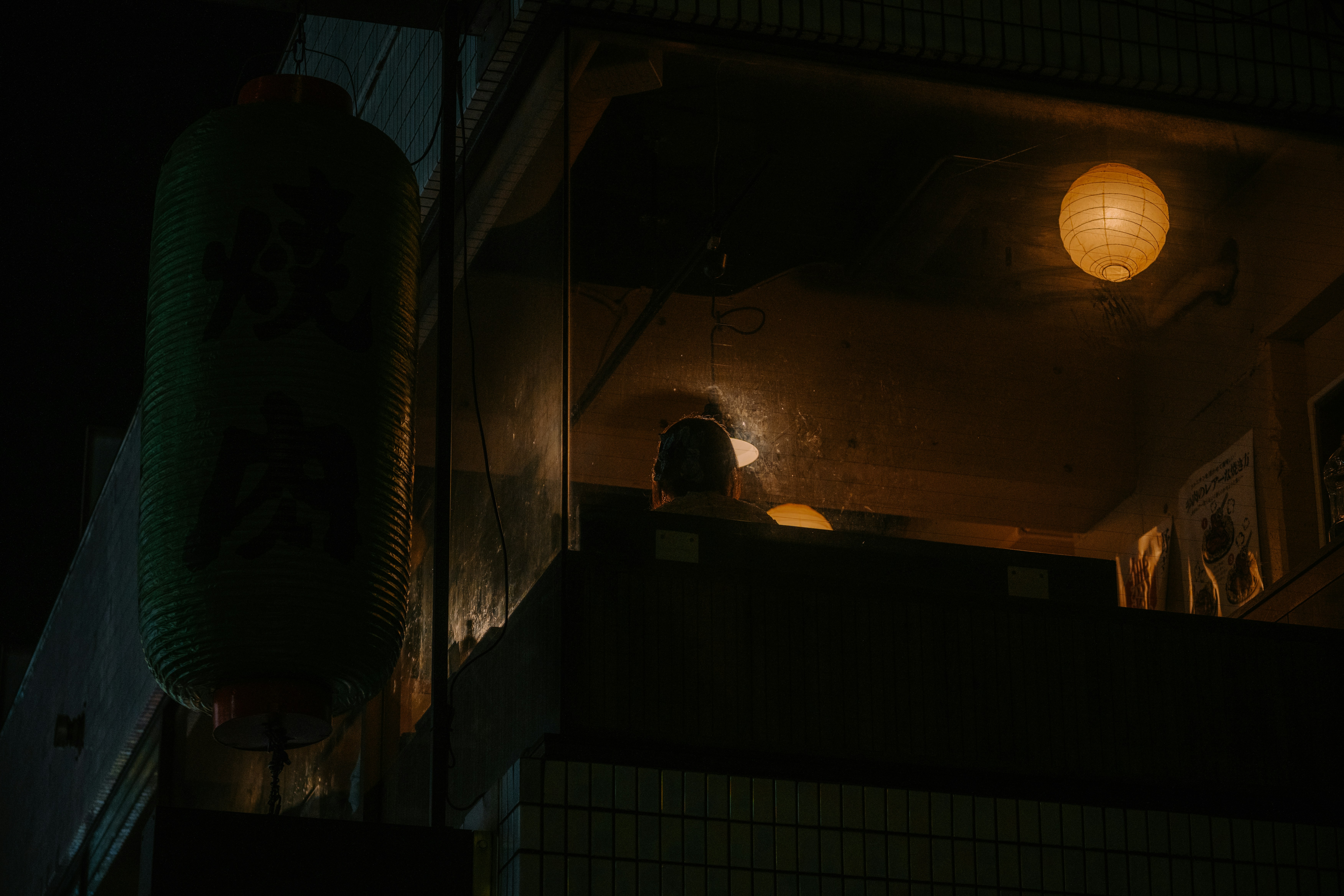 Silent Lanterns Above a Neon Night Café