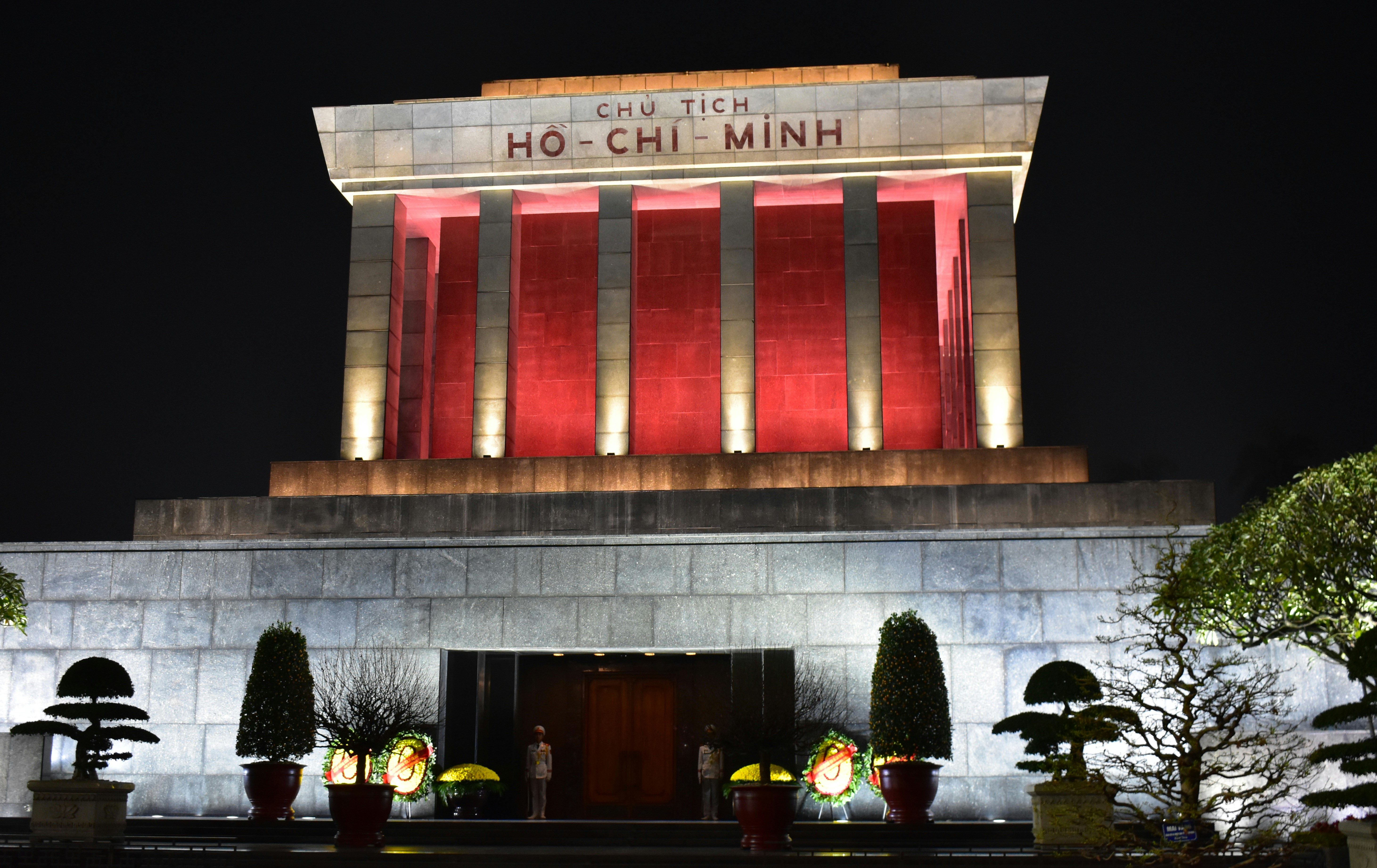Ho Chi Minh Mausoleum at Night: Red Columns in a Quiet Spotlight