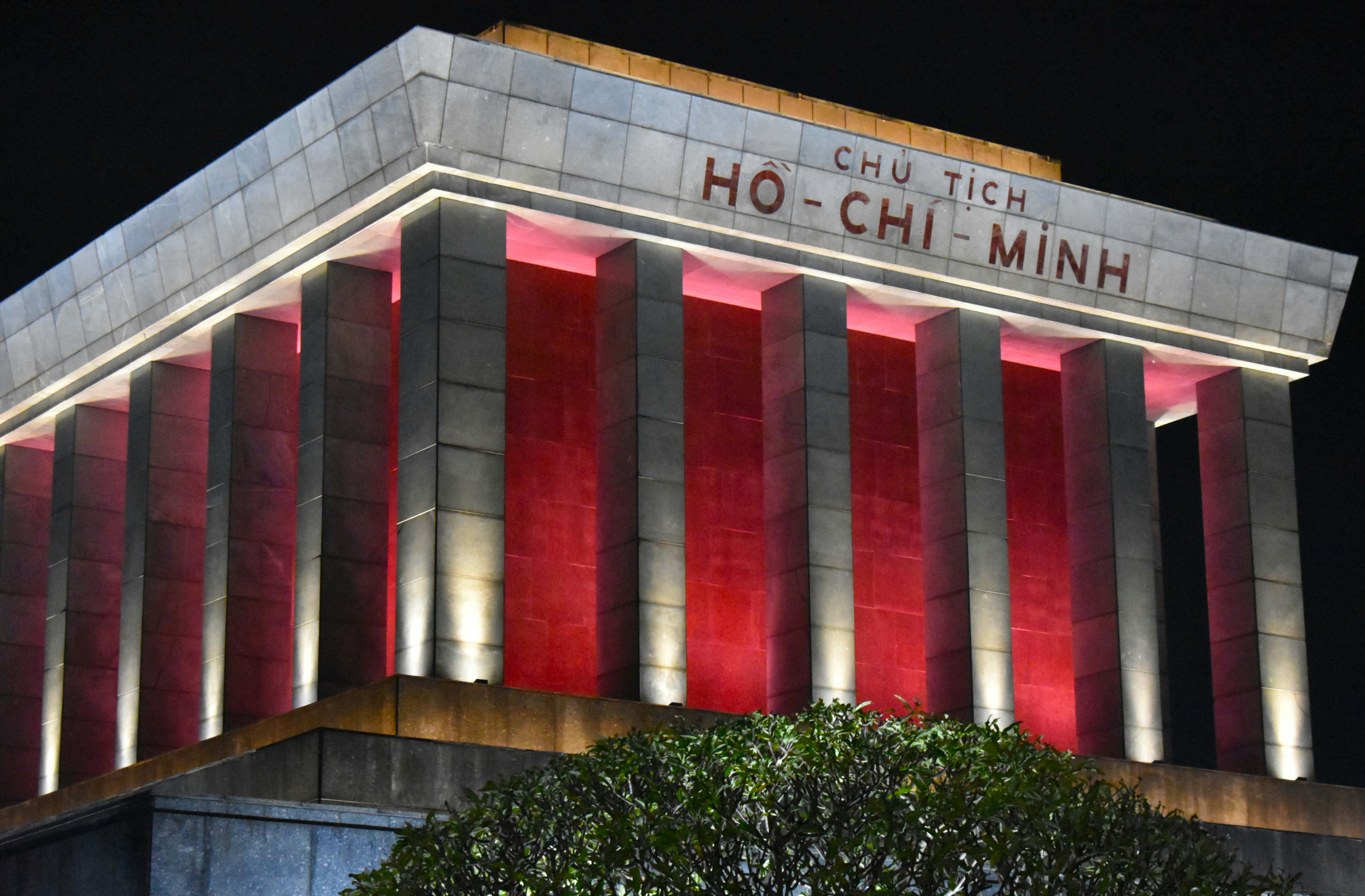 Night Levers of Red Light: Ho Chi Minh City Hall Facade in Neon