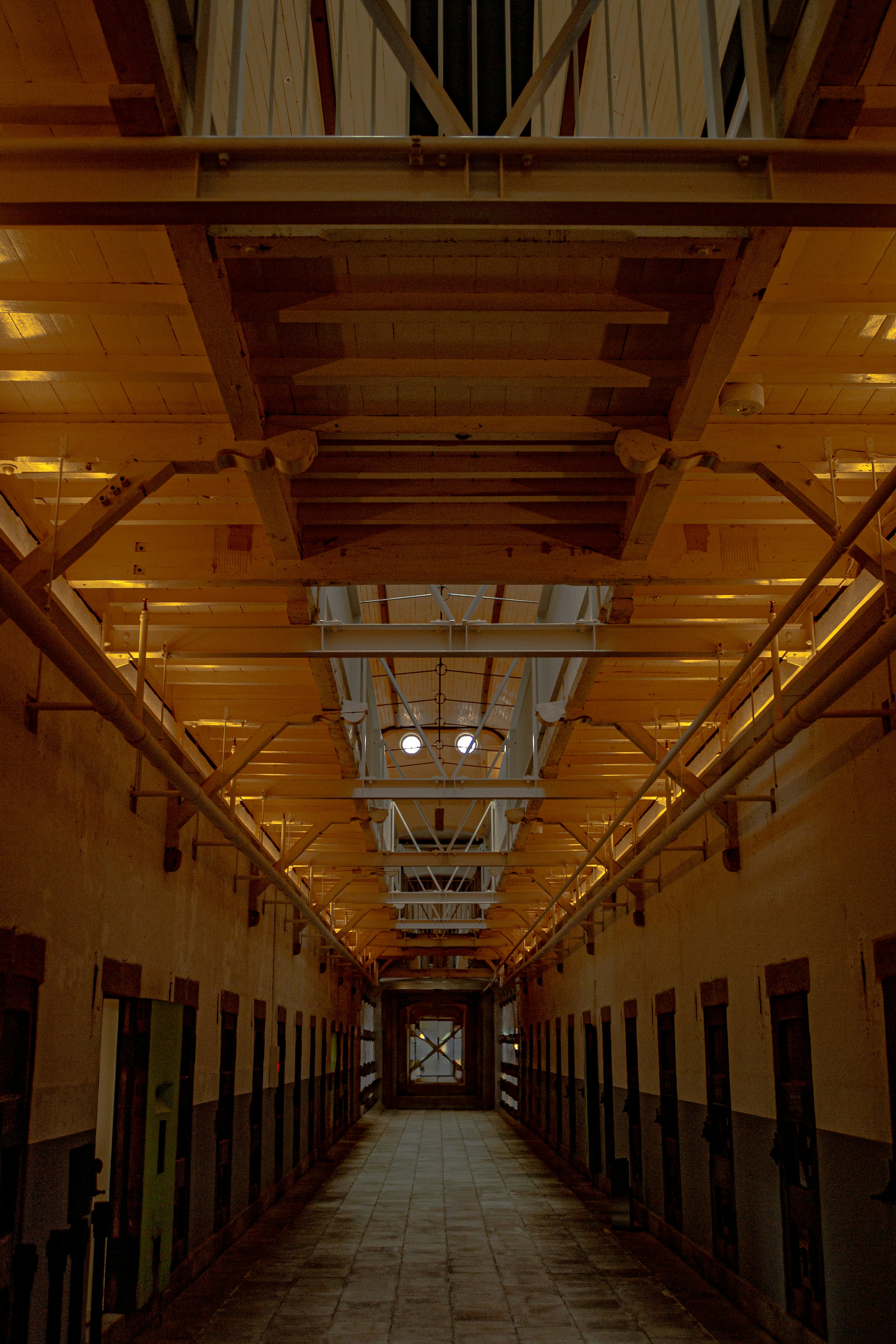 Endless Corridor: Symmetry Under Warm Industrial Light