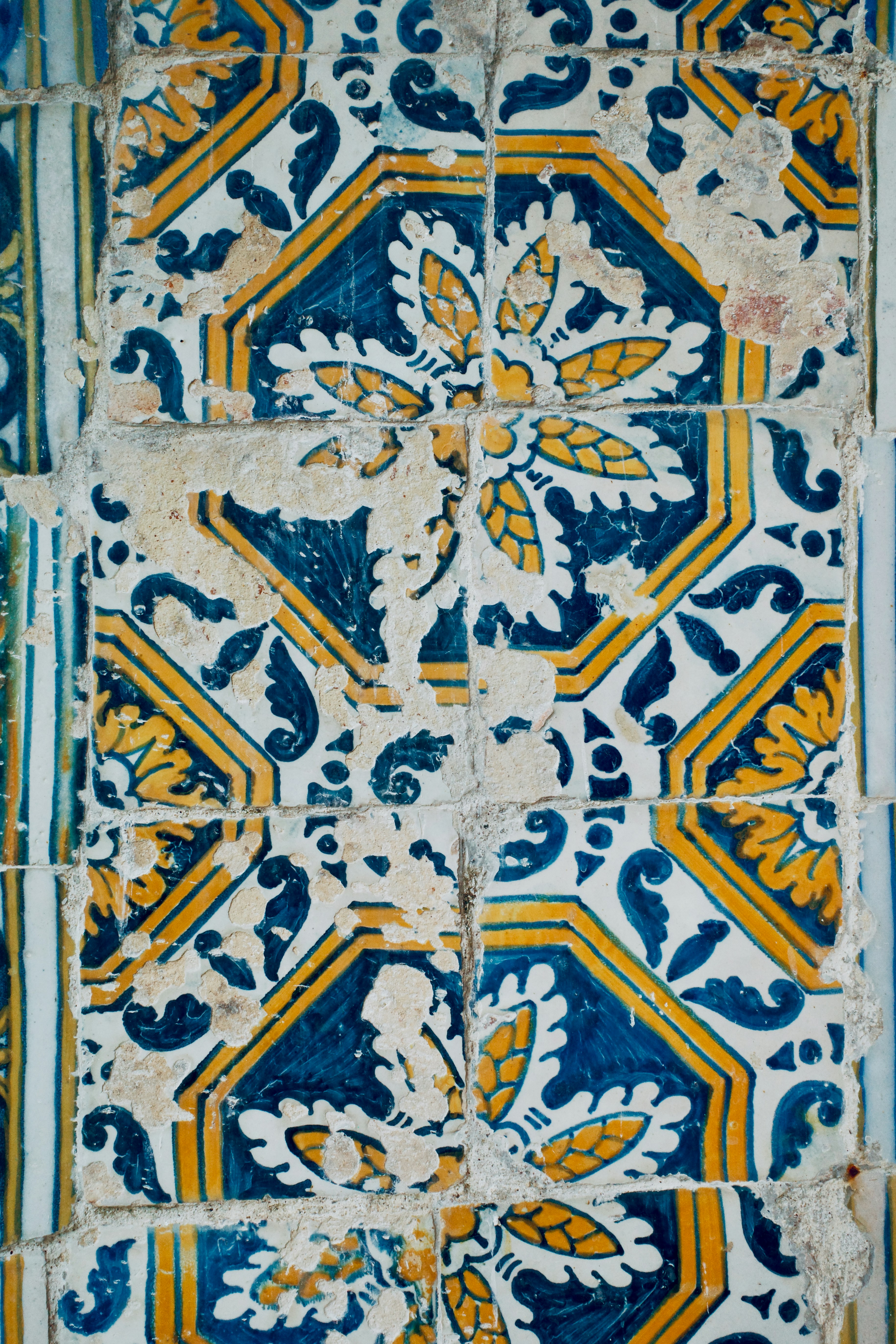 Cracked Tiles of Blue, Gold, and White: Reclaiming a Stepped Mosaic