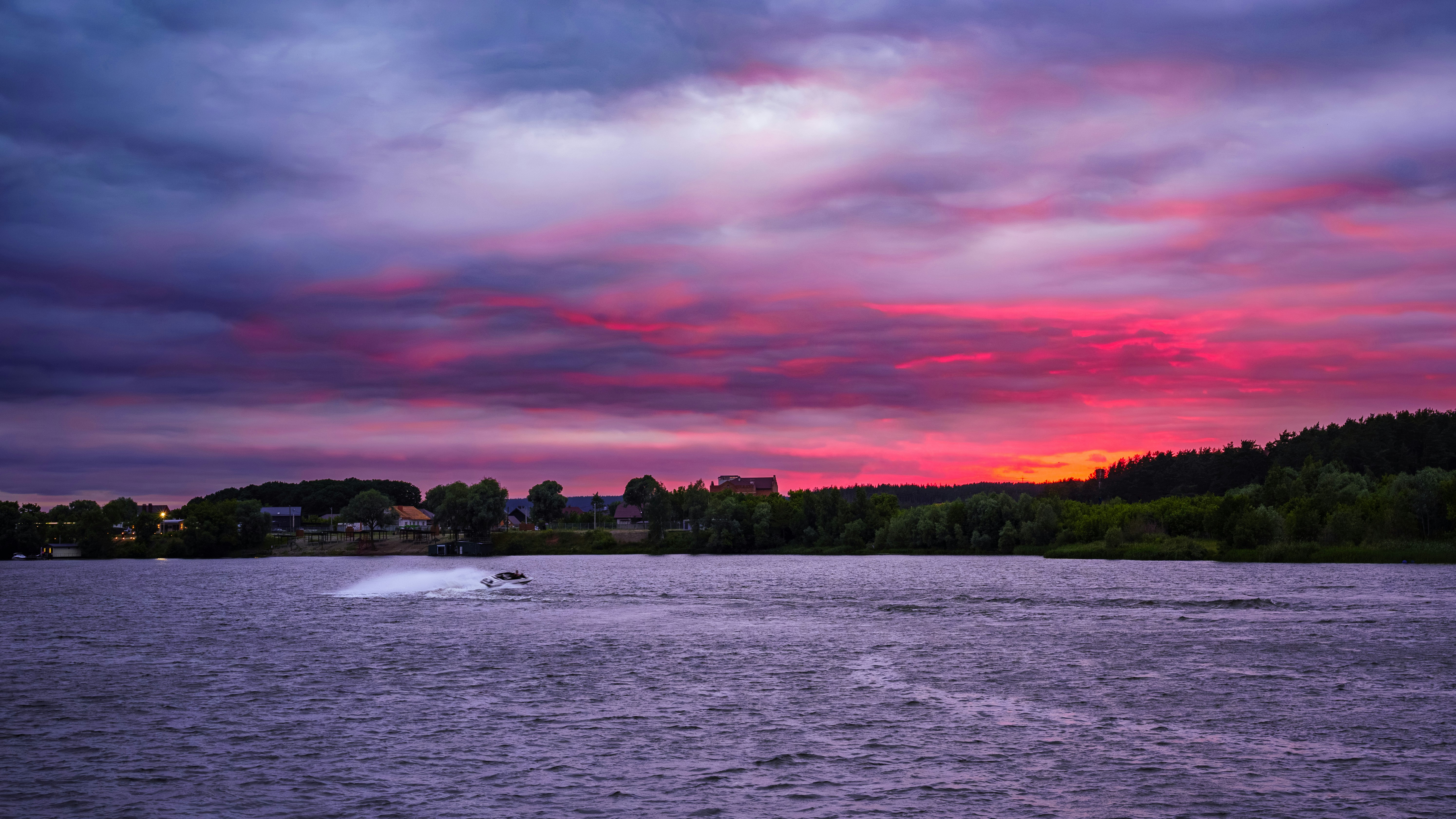 Crimson Skies Over the Quiet Riverbank