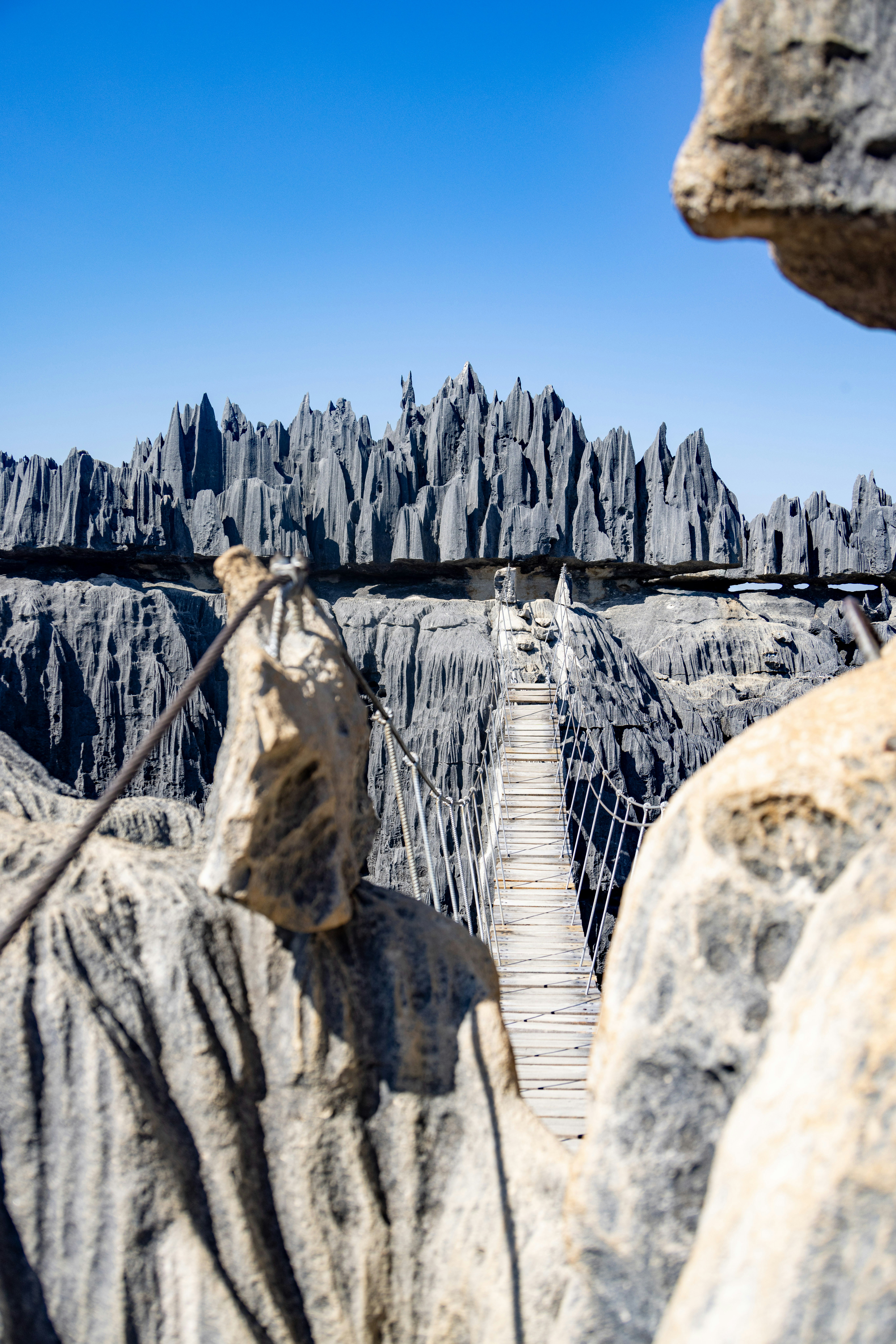Narrow Suspension Path Through Eroded Basalt Spires