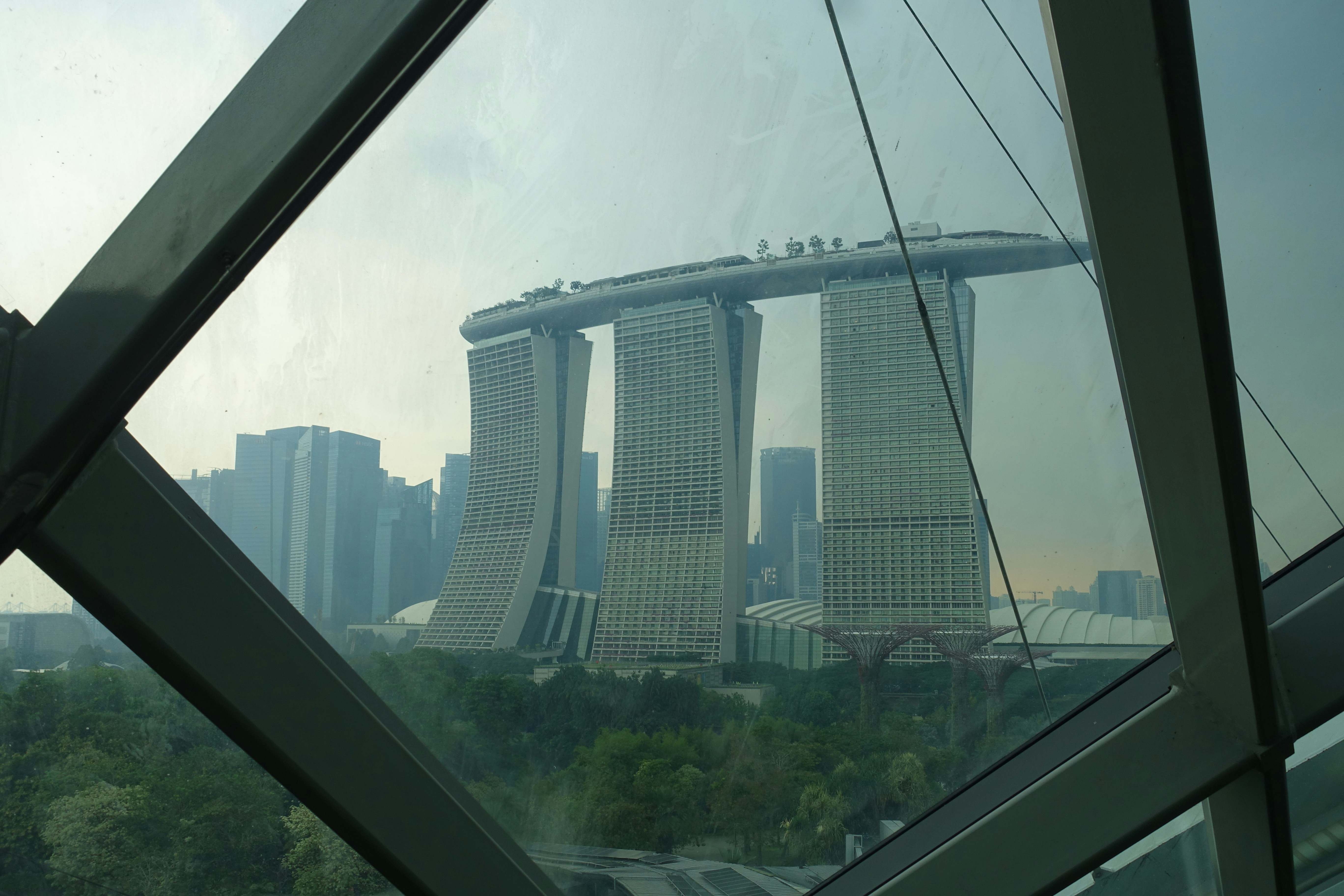Glass Angles, Singapore's Skyline: Marina Bay Sands Through a Framed Window