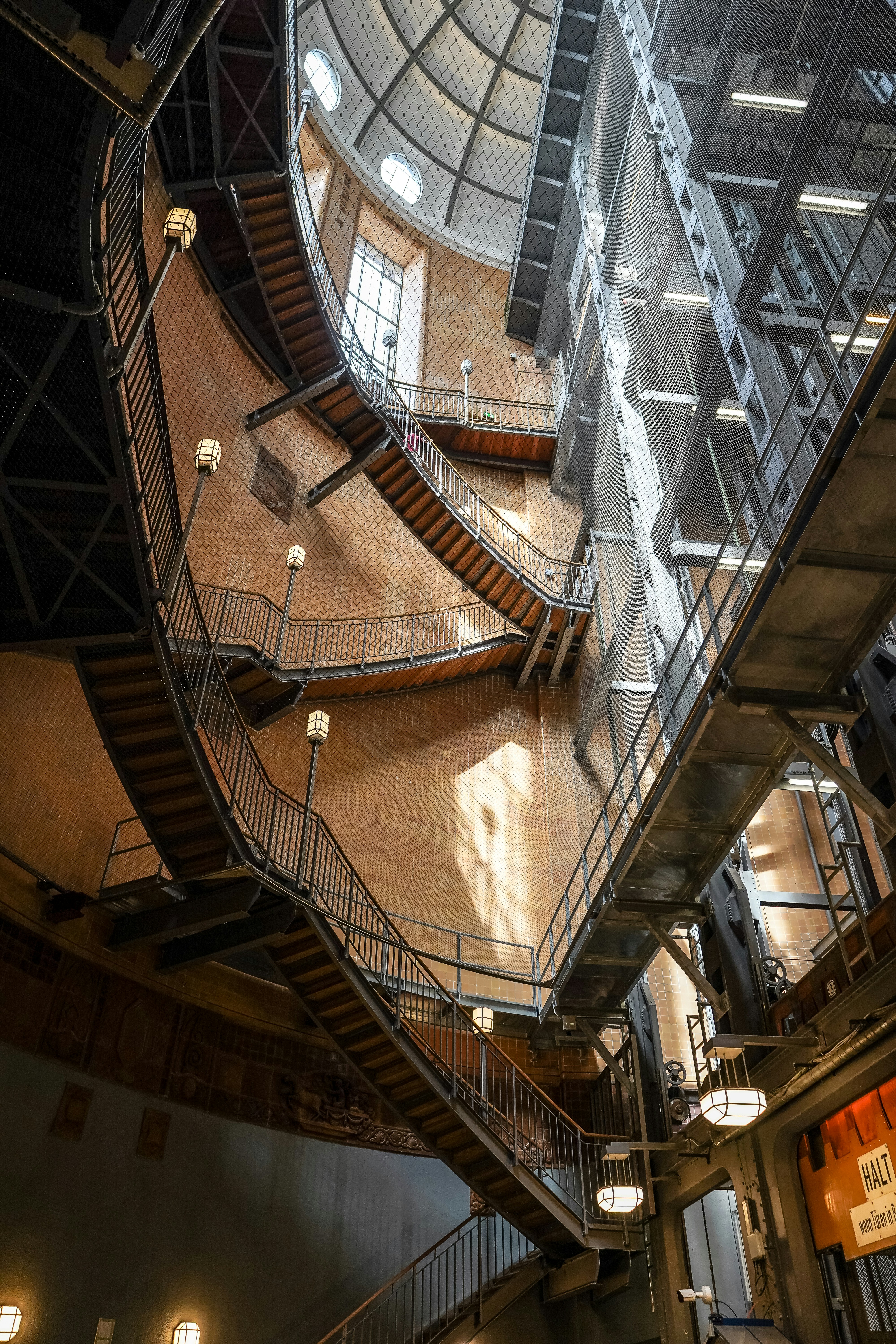 Spiraled Steel Staircase Through a Glass Atrium