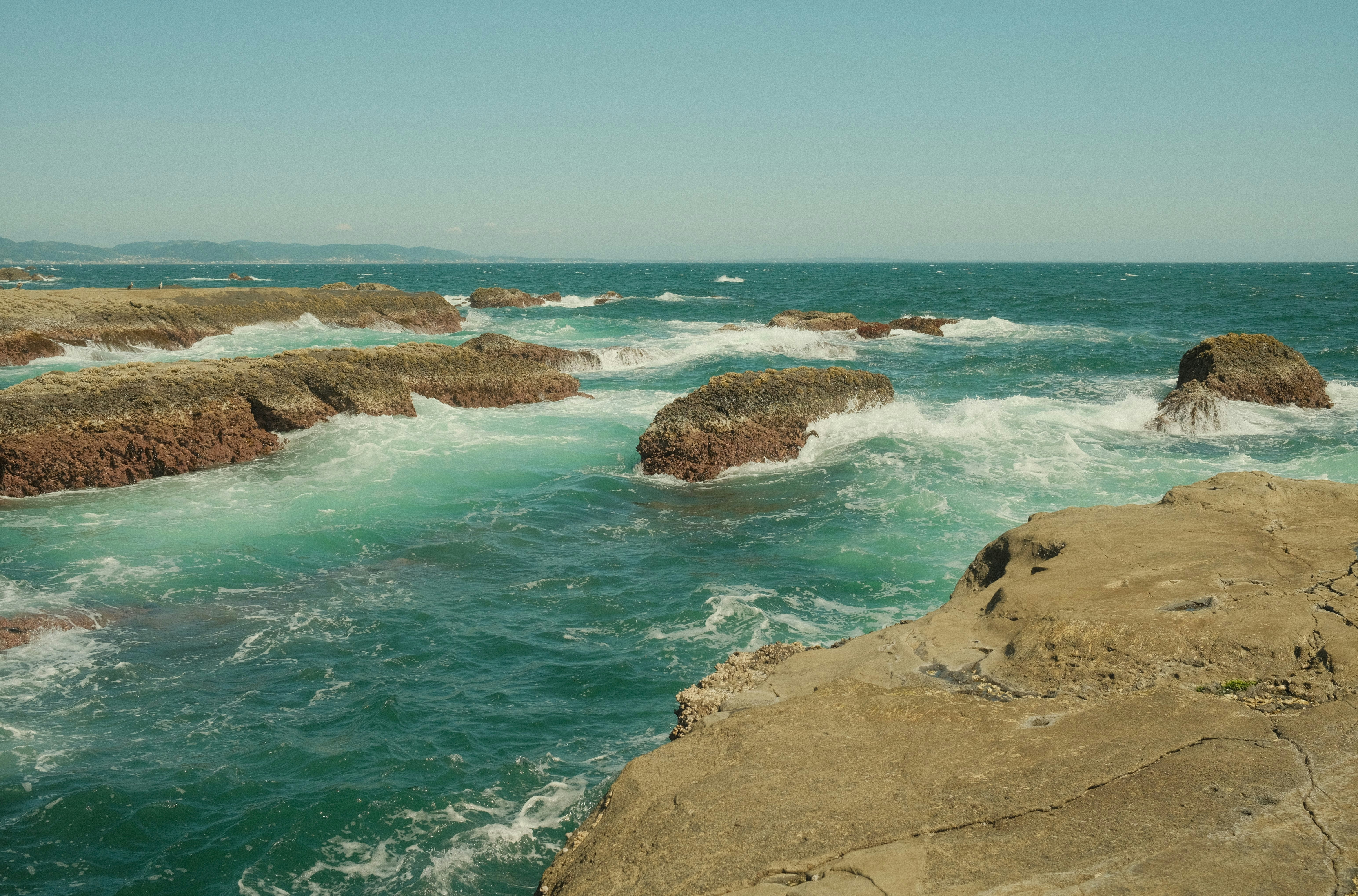 Rugged Tidebreak at the Edge of the Sea