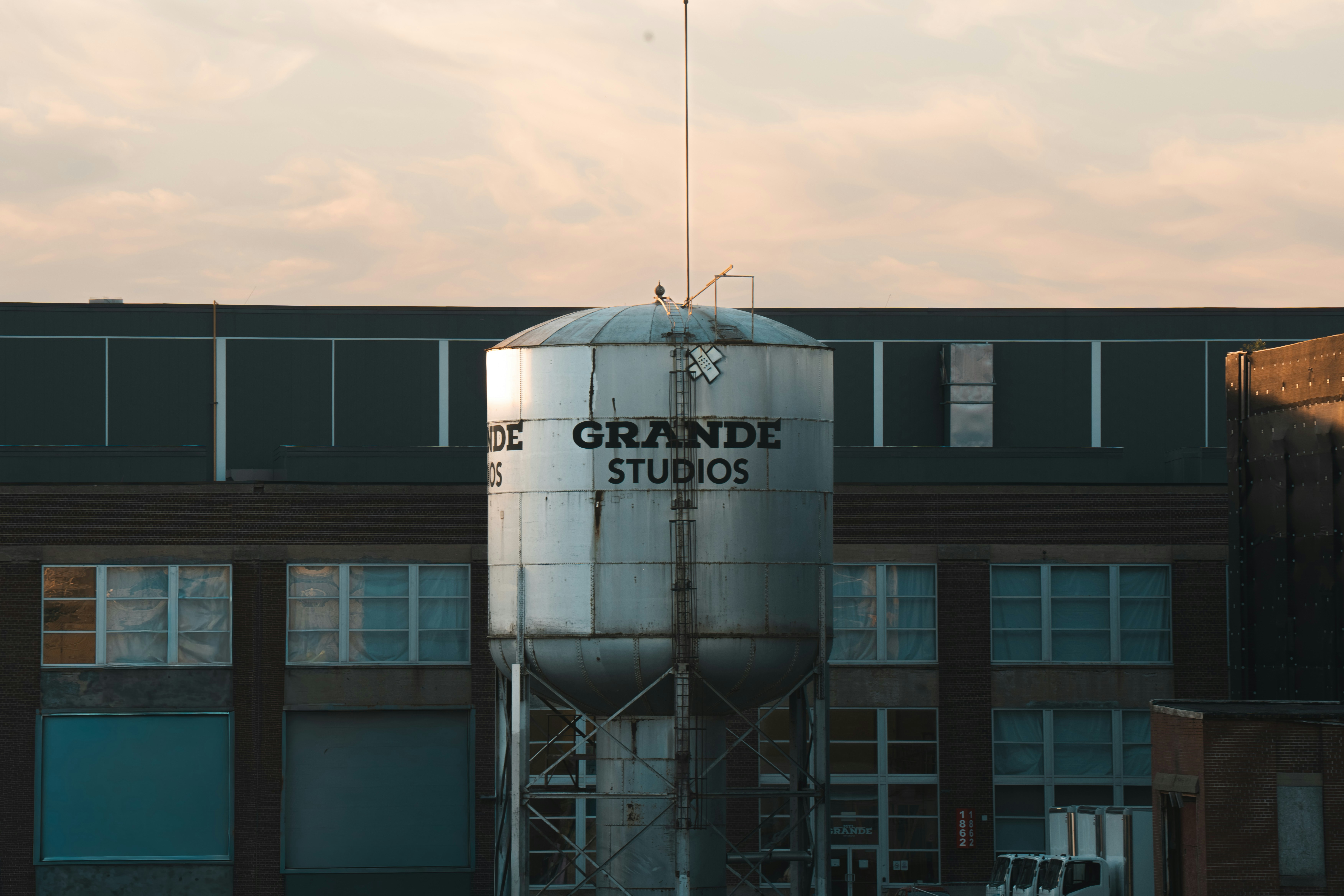 Industrial silo silhouette: a quiet moment above the brick factory