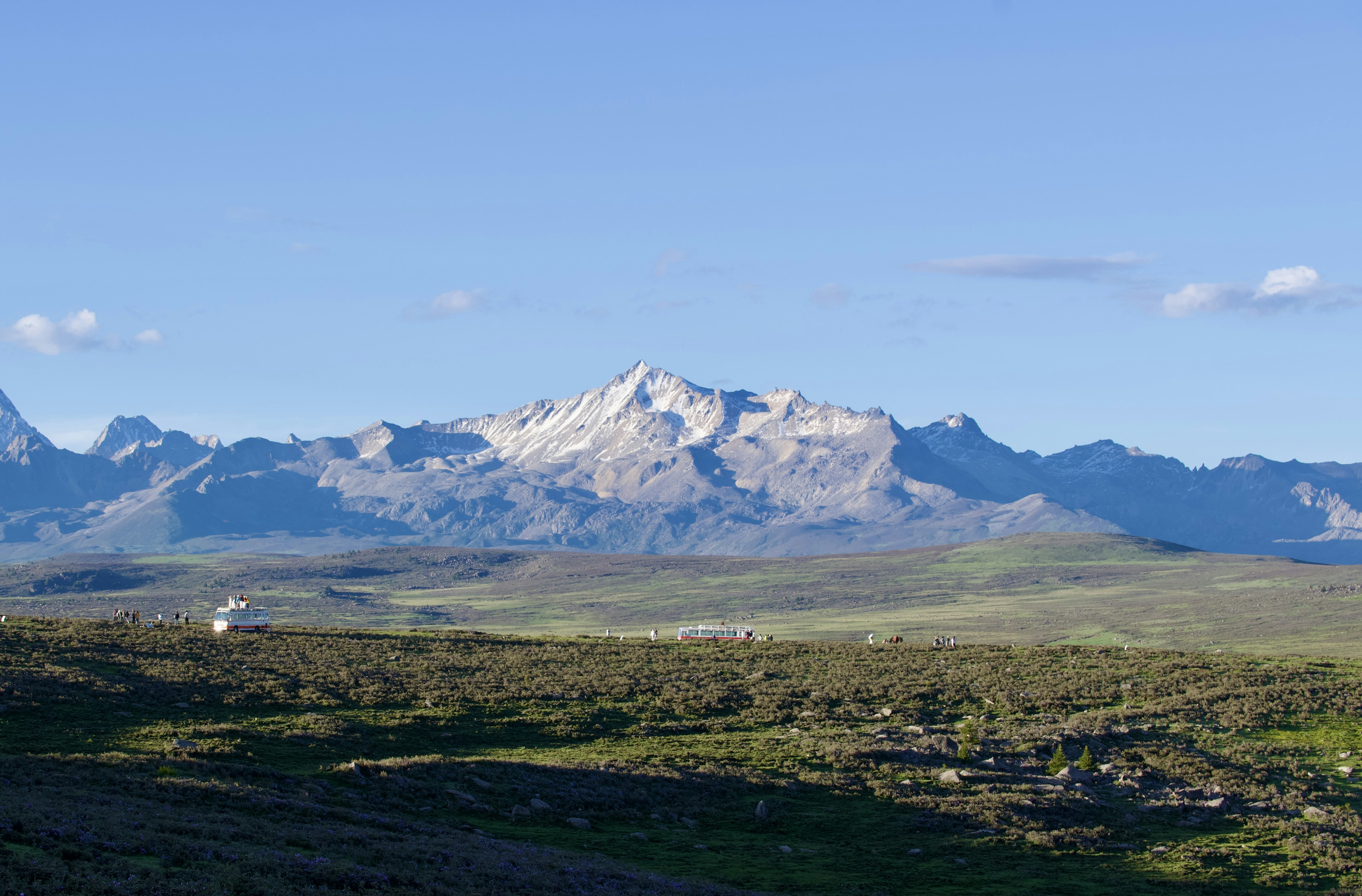 Snow-Capped Ridge Under a Clear Blue Sky