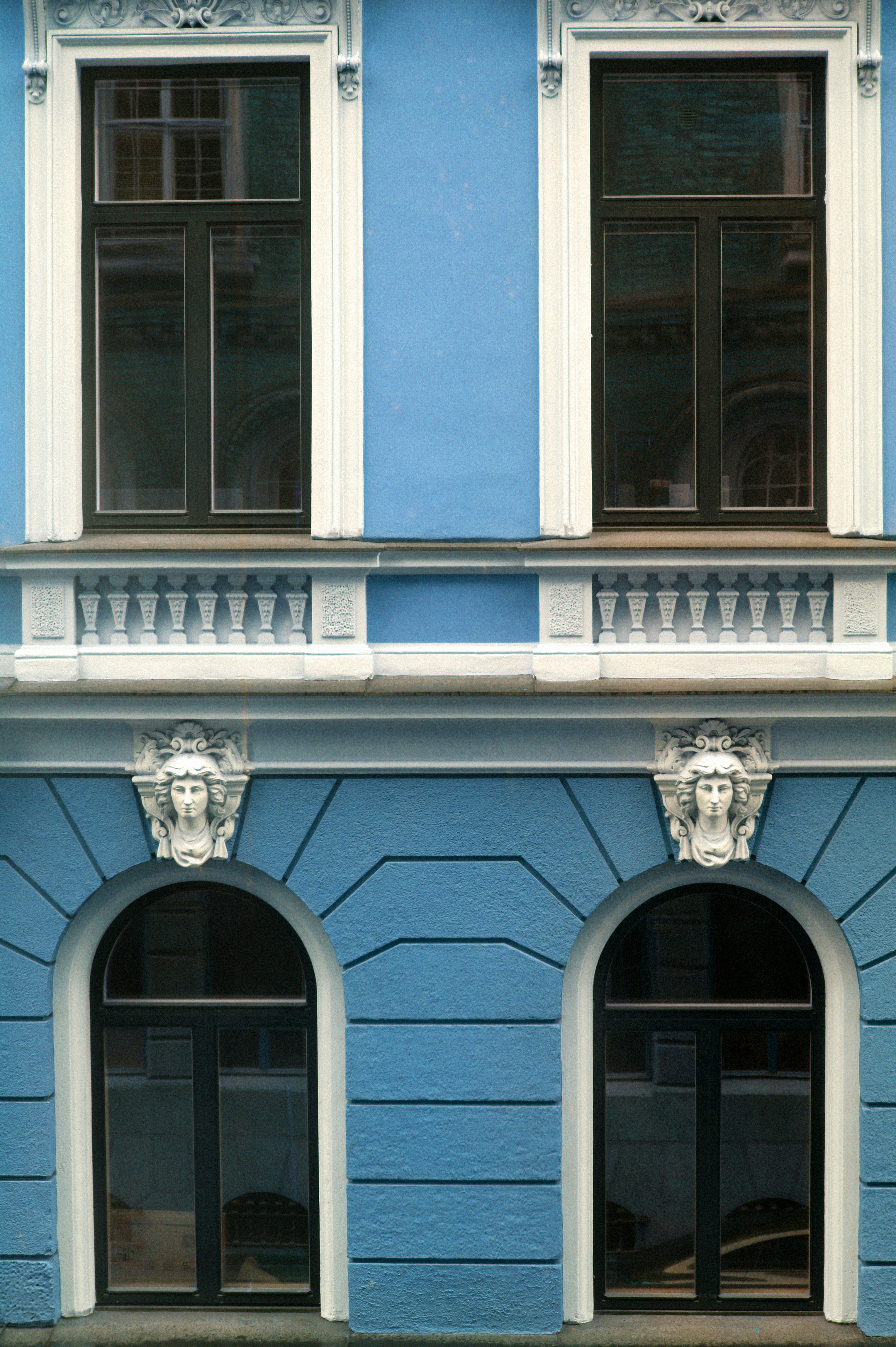 Azure Facade: Symmetry and Sculpted Brilliance