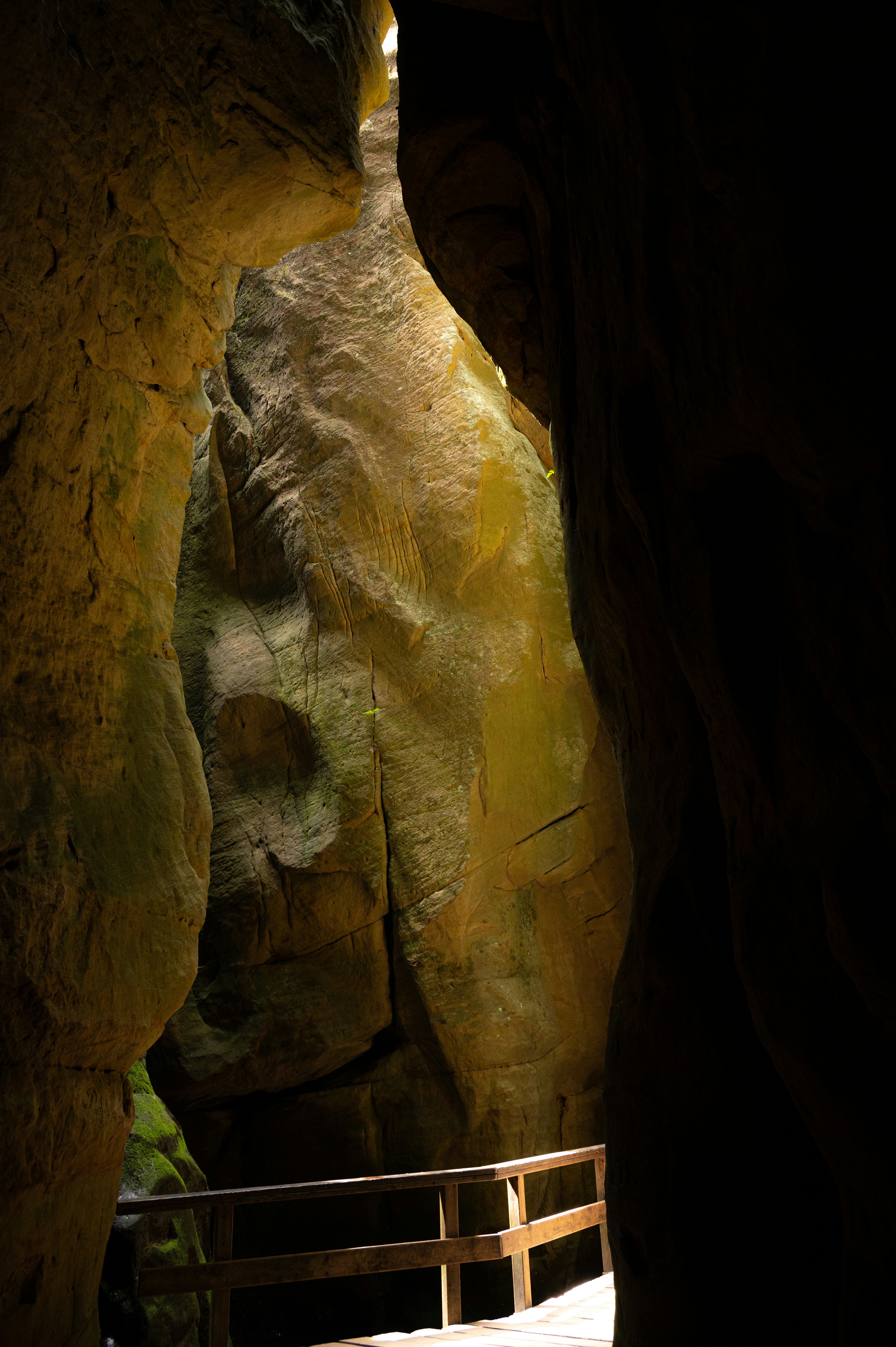 Soft Light in a Canyon Rook: A Sliver of Dawn Through Stone