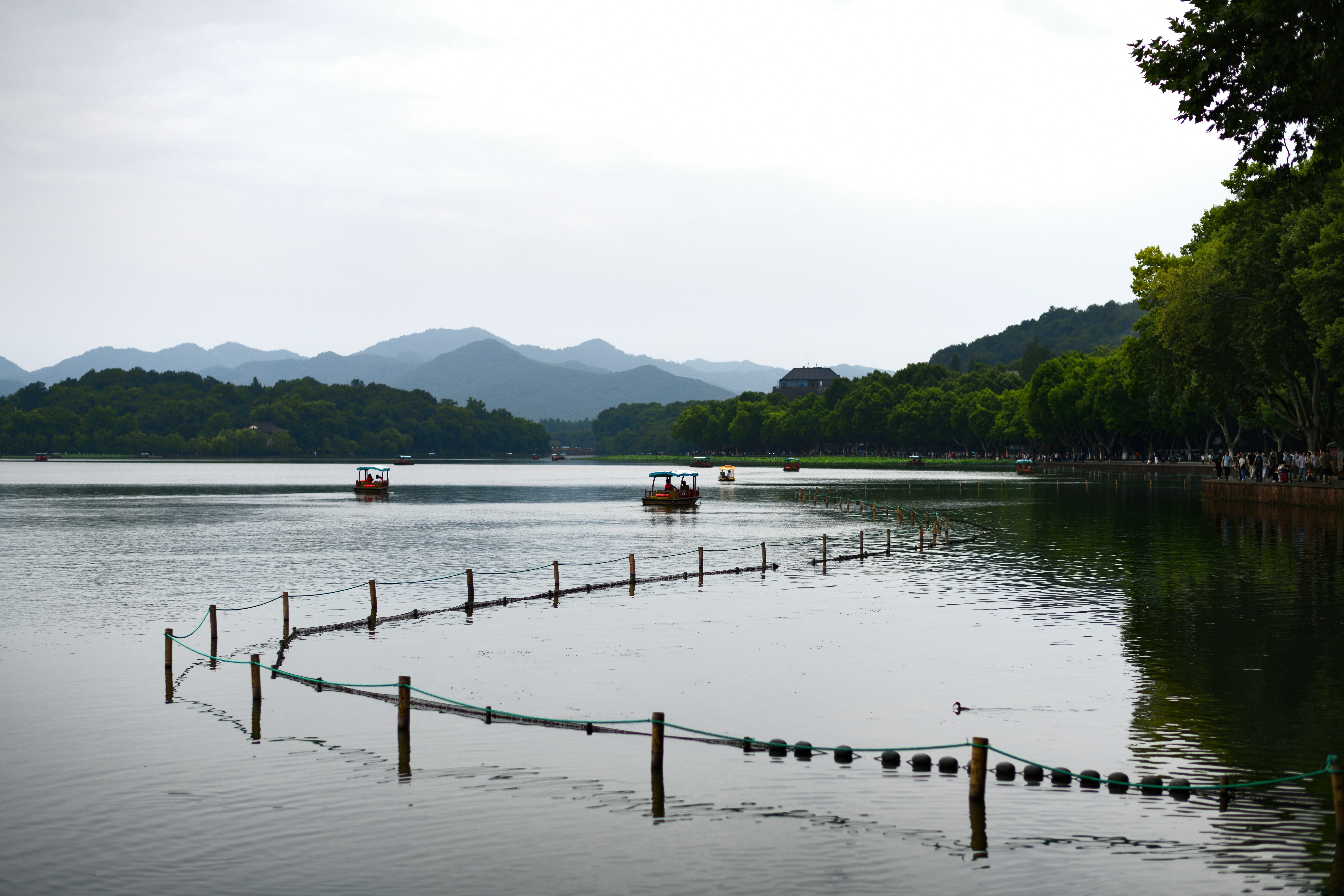 Calm Lake, Open Sky: A Serene Waterway Framed by Gentle Hills