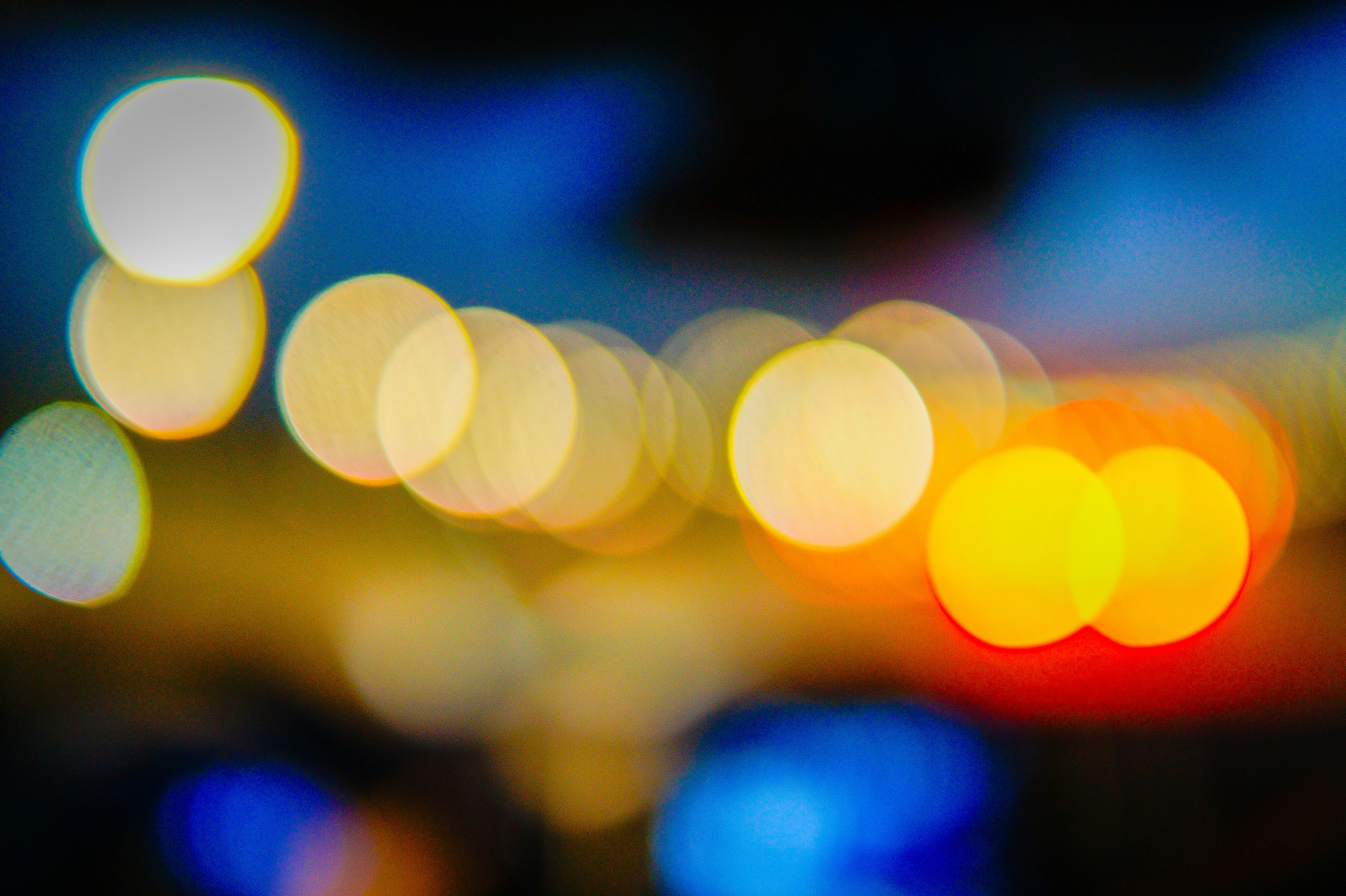 Bokeh City Lights: Soft Orbs in a Night Blur