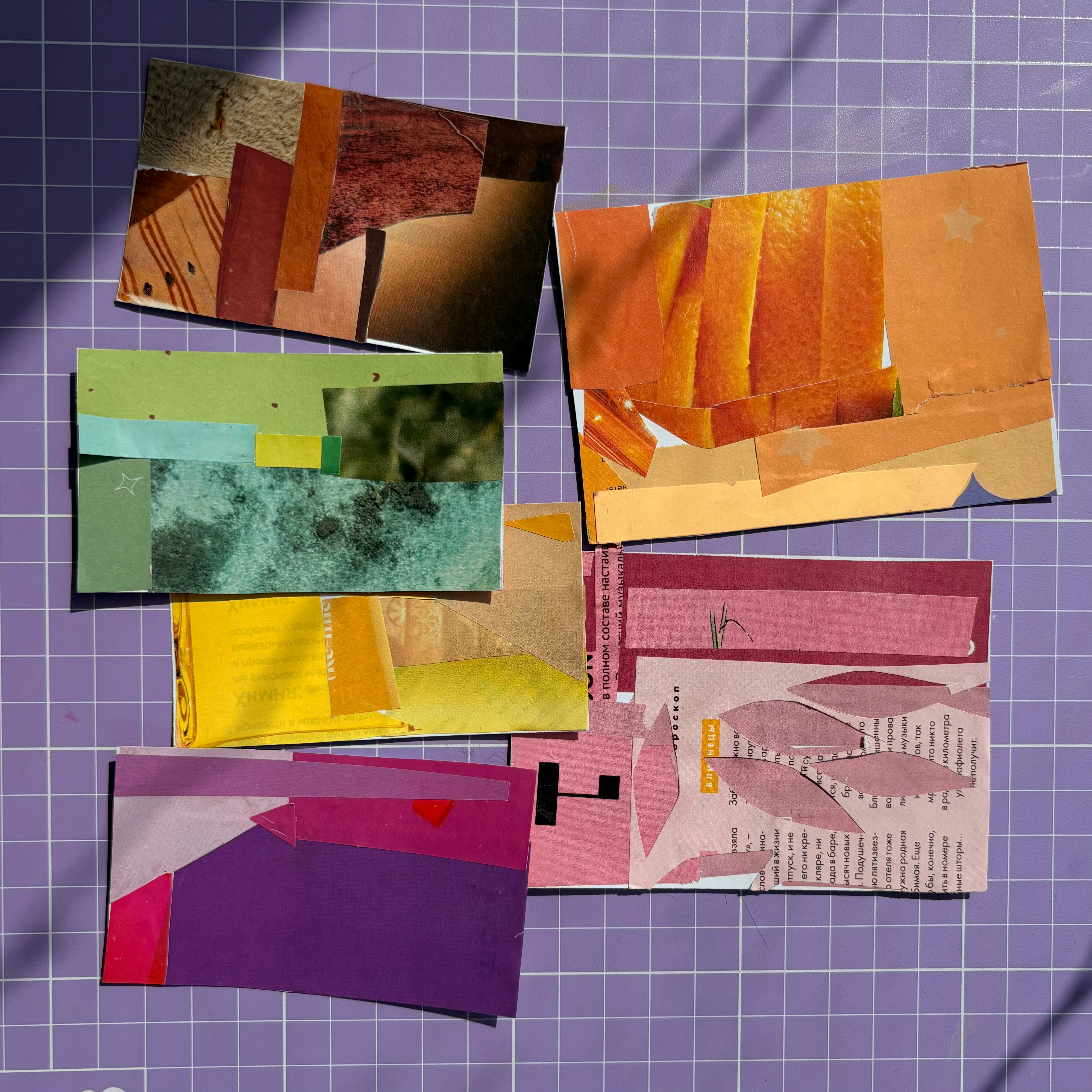 Patchwork of Color: A Fleet of Cutouts on a Purple Grid