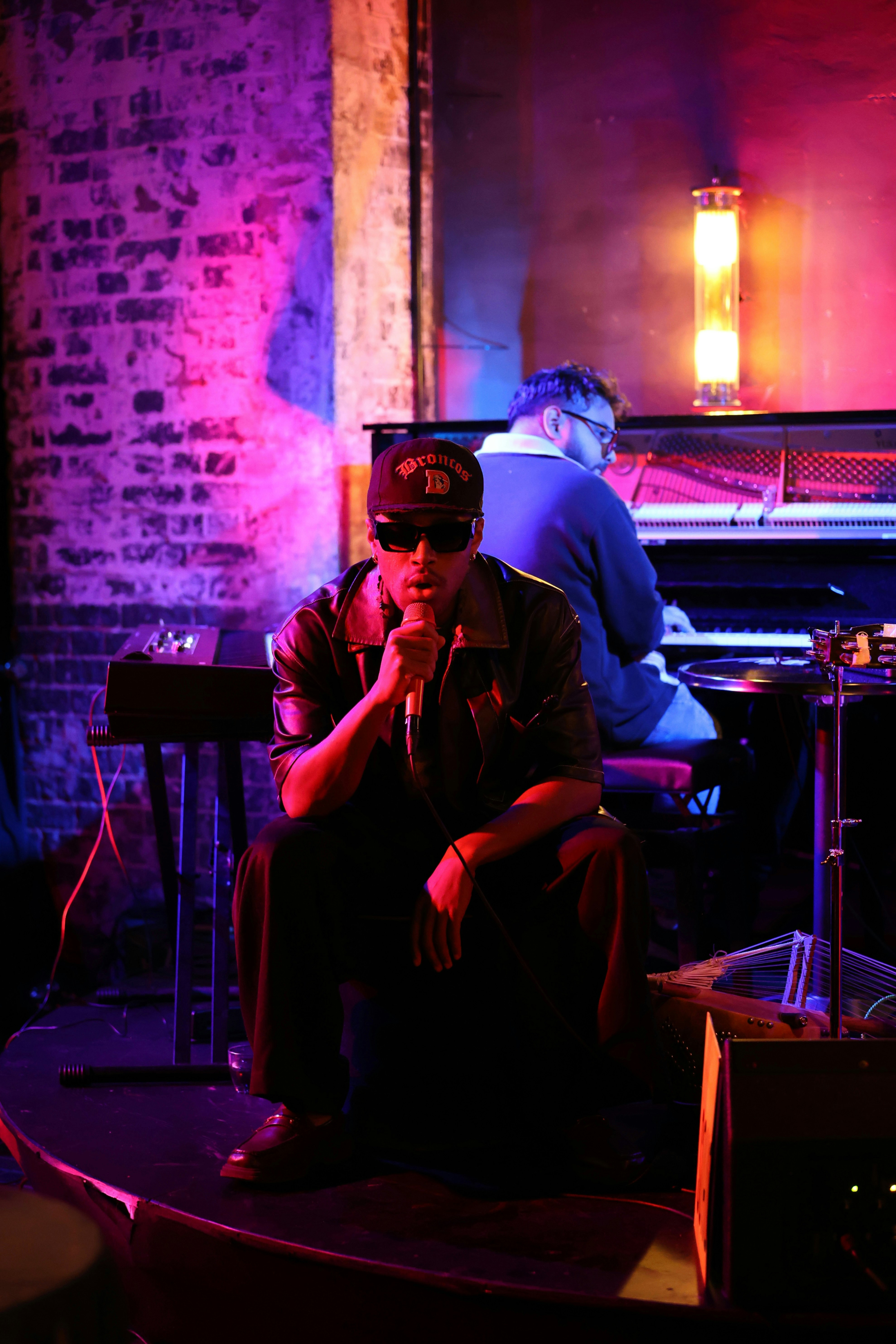Midnight Serenade: A Vocalist in Neon-Hued Reverie