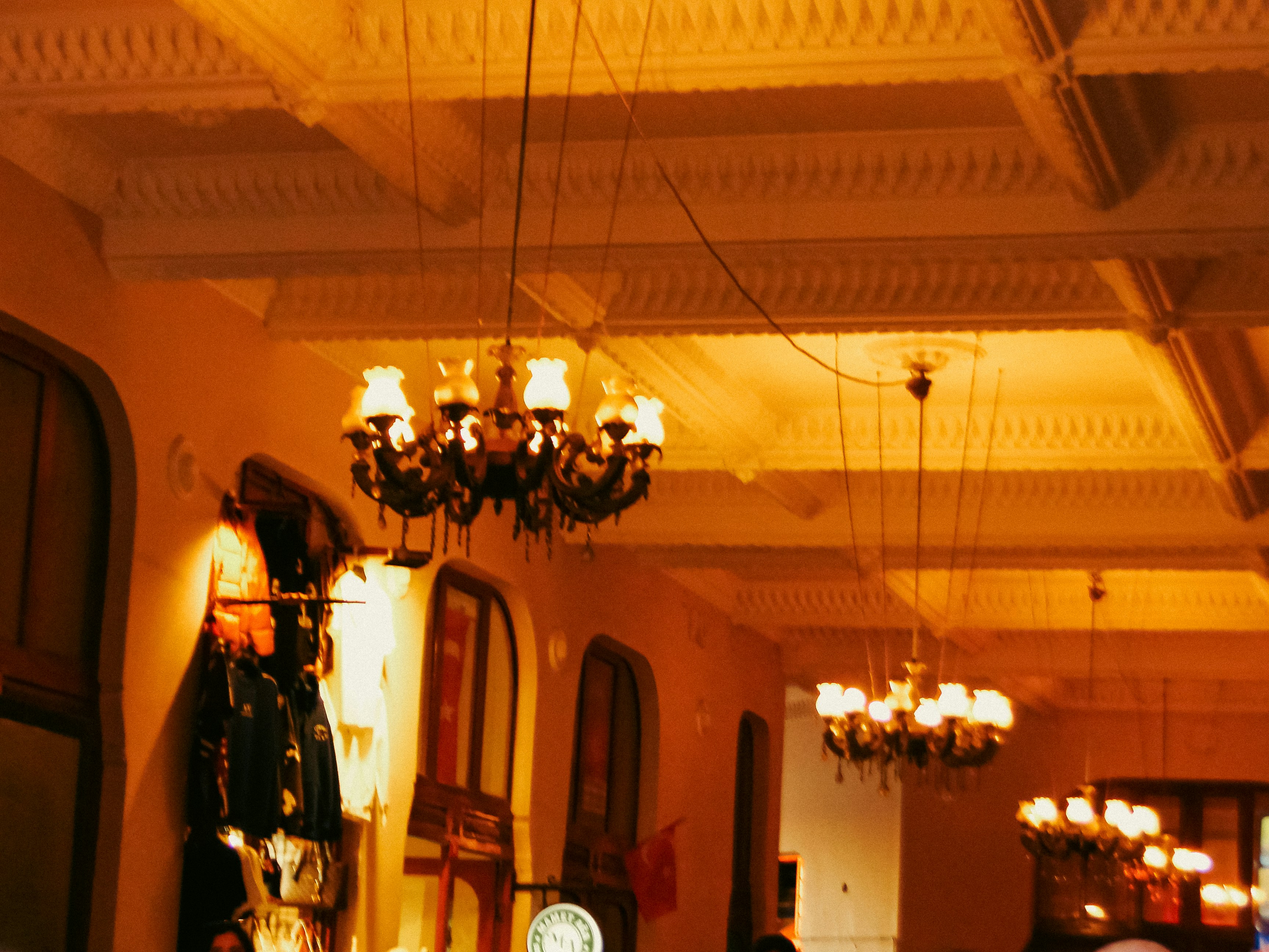 Warm Chandeliers Over a Vintage Interior